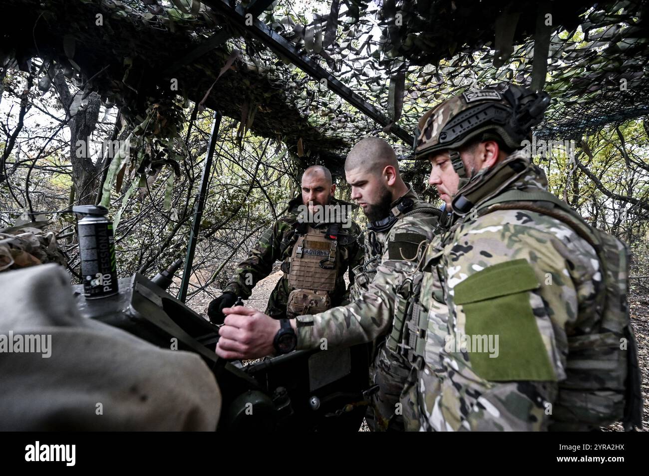 DONETSK REGION, UKRAINE - OCTOBER 25, 2024 - Artillerymen of the ...