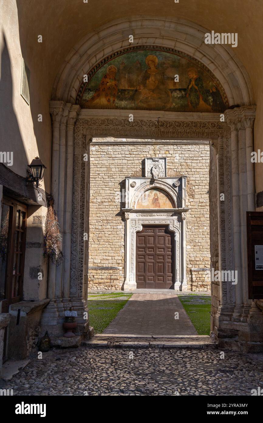The arched Romanesque gateway of the Benedictine Abbey of Santa Maria ...
