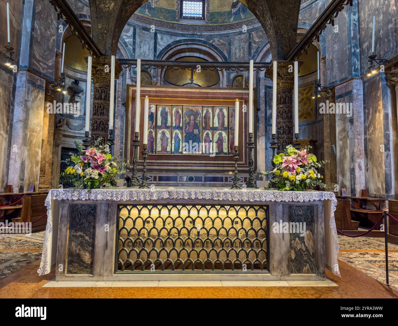The high altar and tomb of St. Mark in the chancel of St. Mark's Basilica in Venice, Italy. The ...