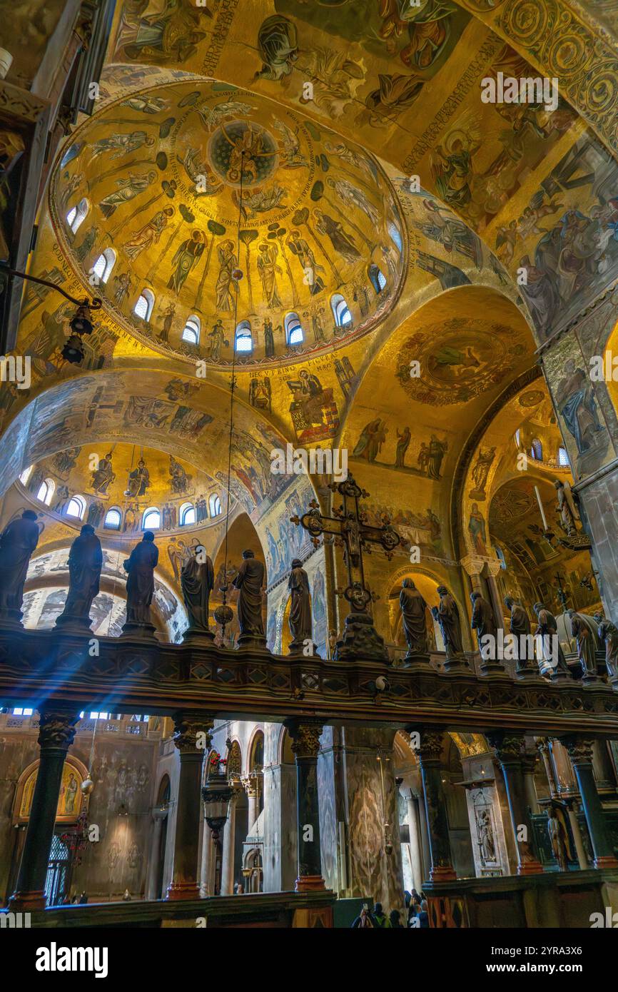 The silver and bronze crucifix on the Gothic altar screen in St. Mark's ...