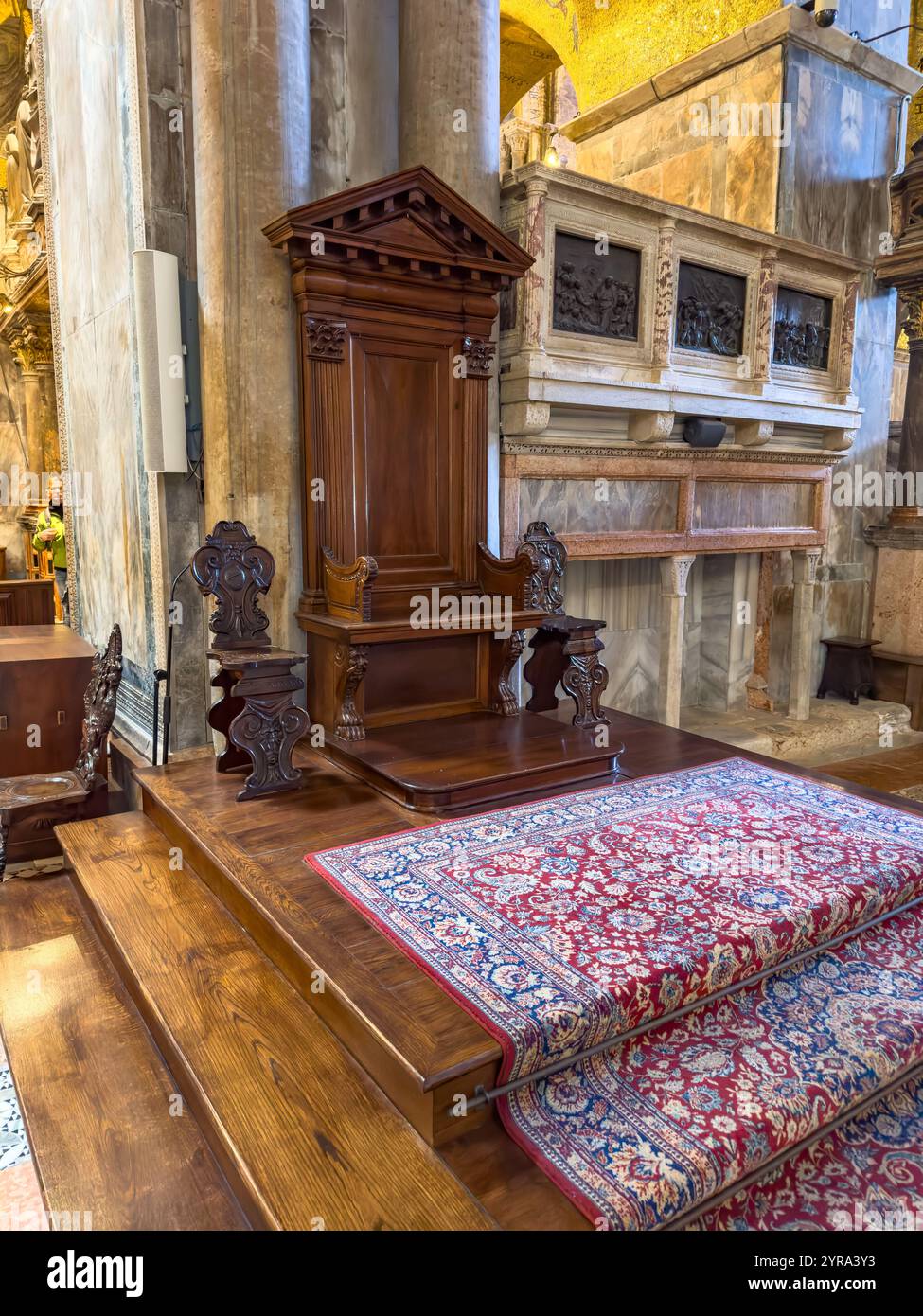 The carved wooden cathedra or Bishop's Throne in St. Marks Basilica in ...