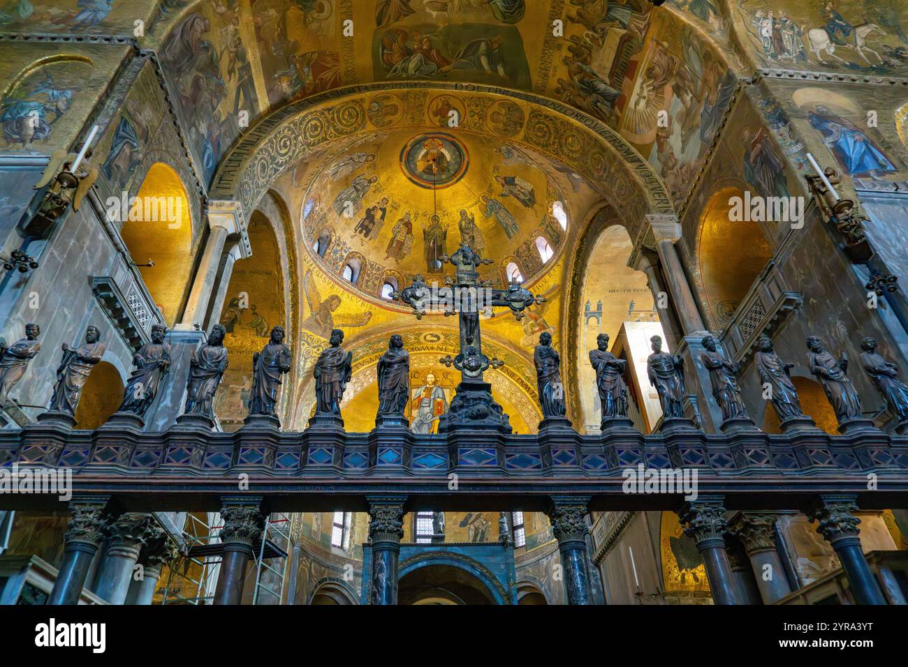 The silver and bronze crucifix on the Gothic altar screen in St. Mark's ...