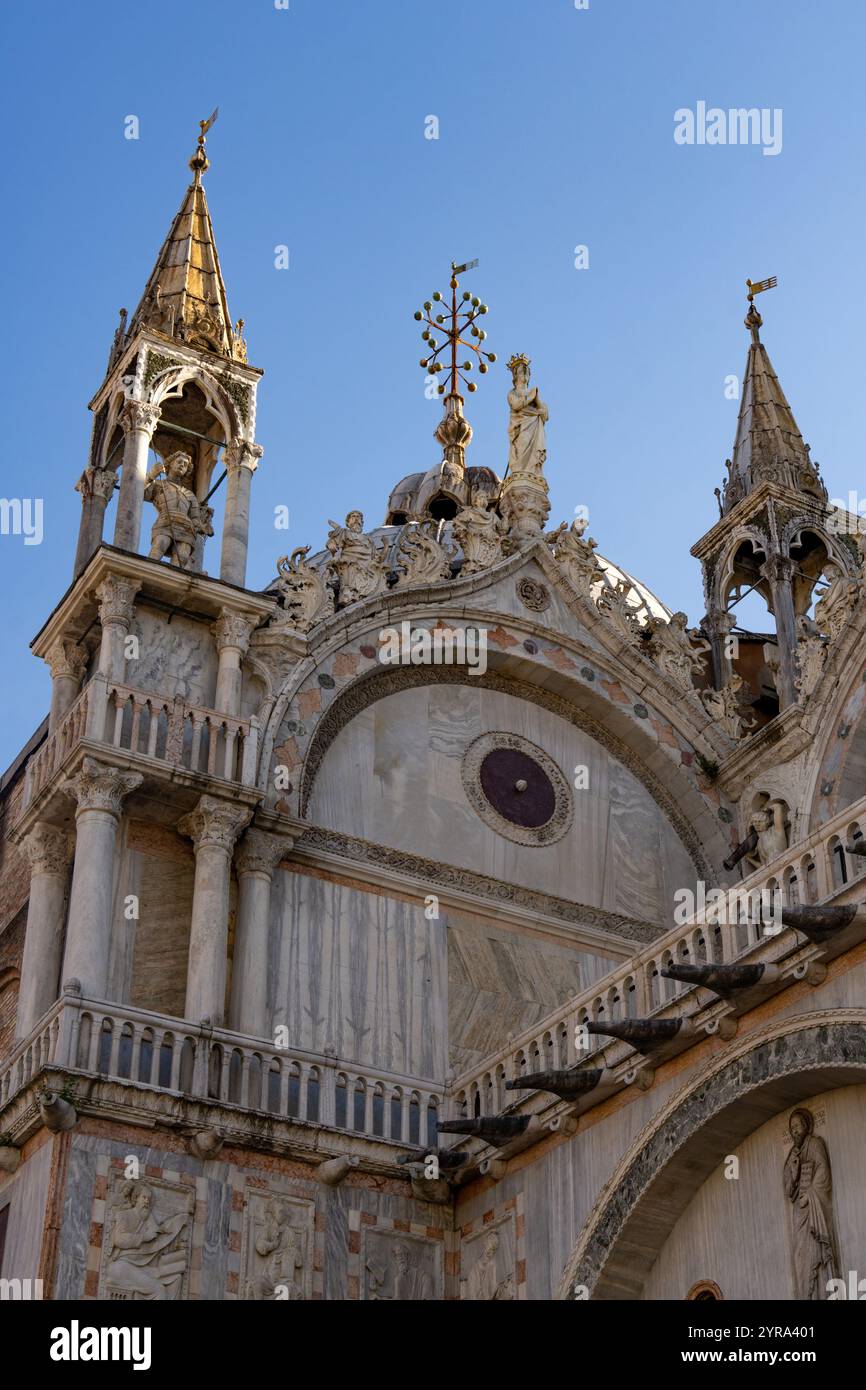 Gothic towers & statues on the north side of St. Mark's Basilica in ...