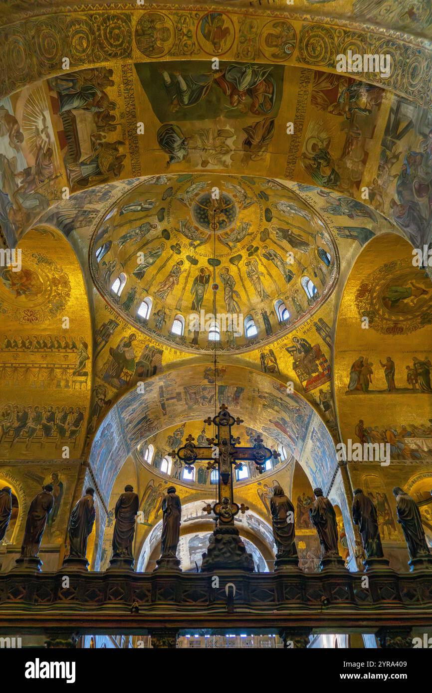 The silver and bronze crucifix on the Gothic altar screen in St. Mark's ...