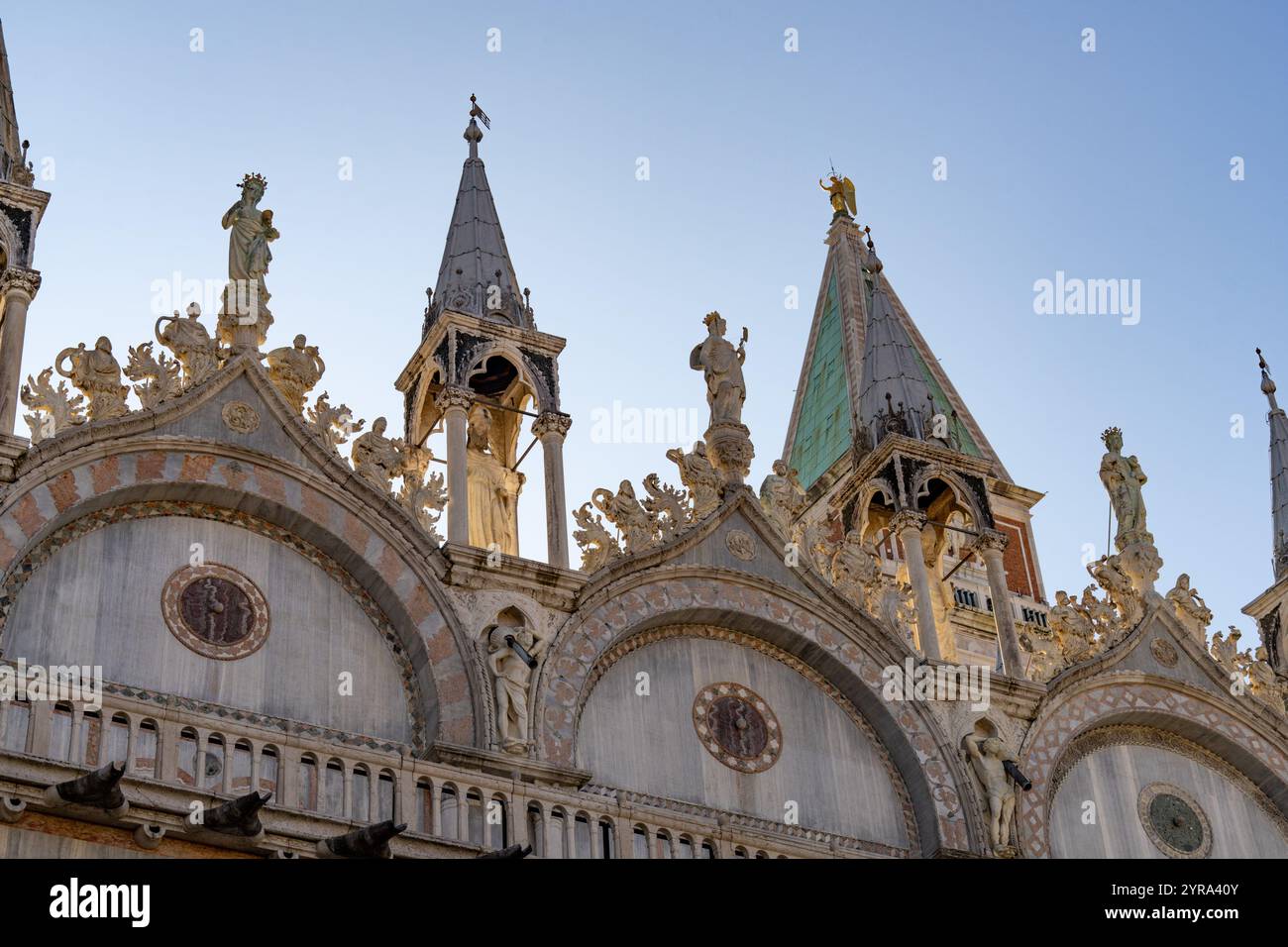 Gothic towers & statues on the north side of St. Mark's Basilica in ...