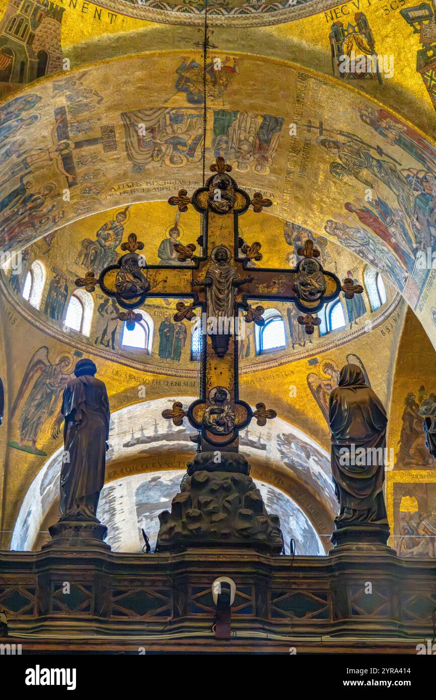 The silver and bronze crucifix on the Gothic altar screen in St. Mark's ...