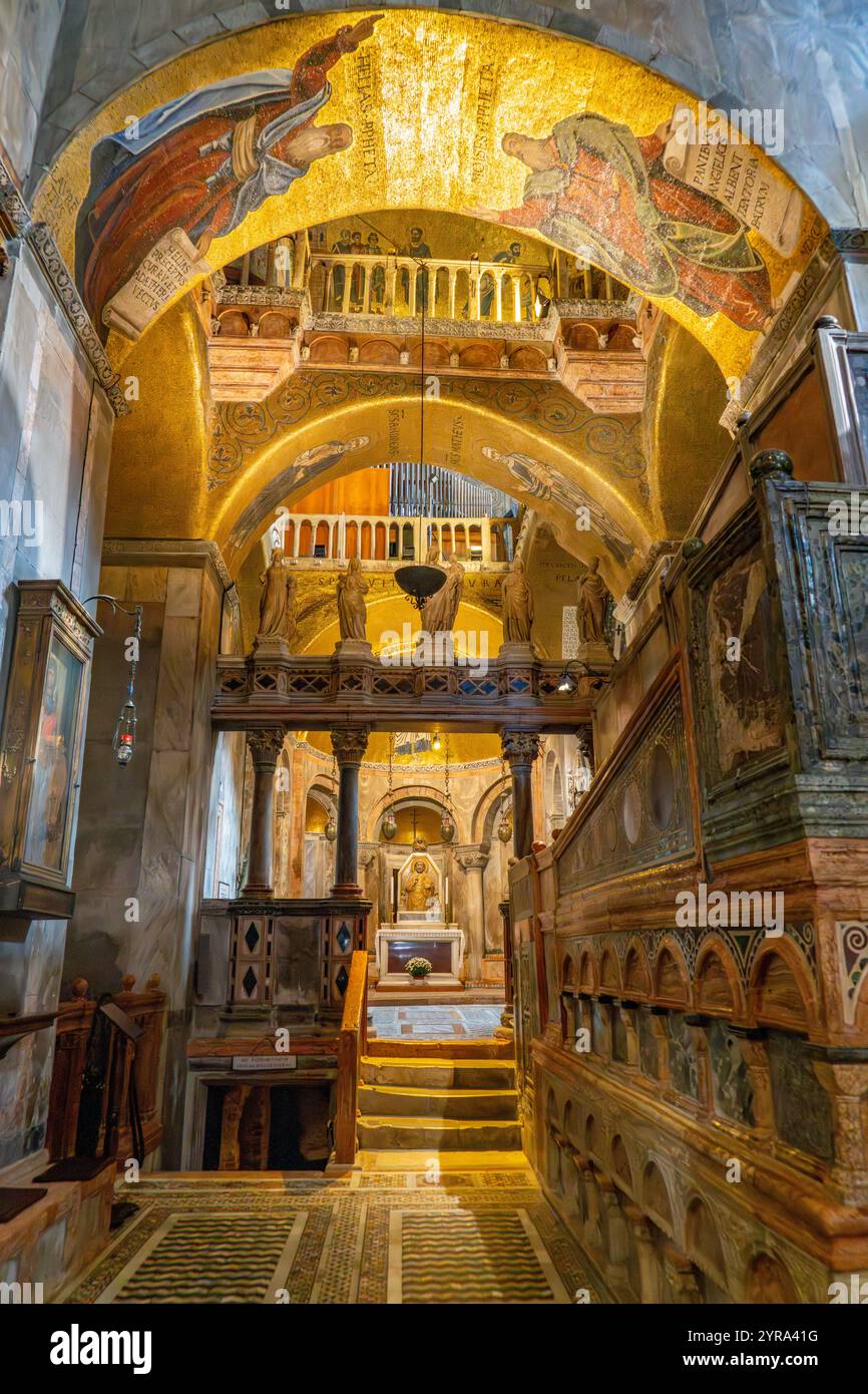 A beautiful side chapel with statues and golden mosaics in St. Mark's ...