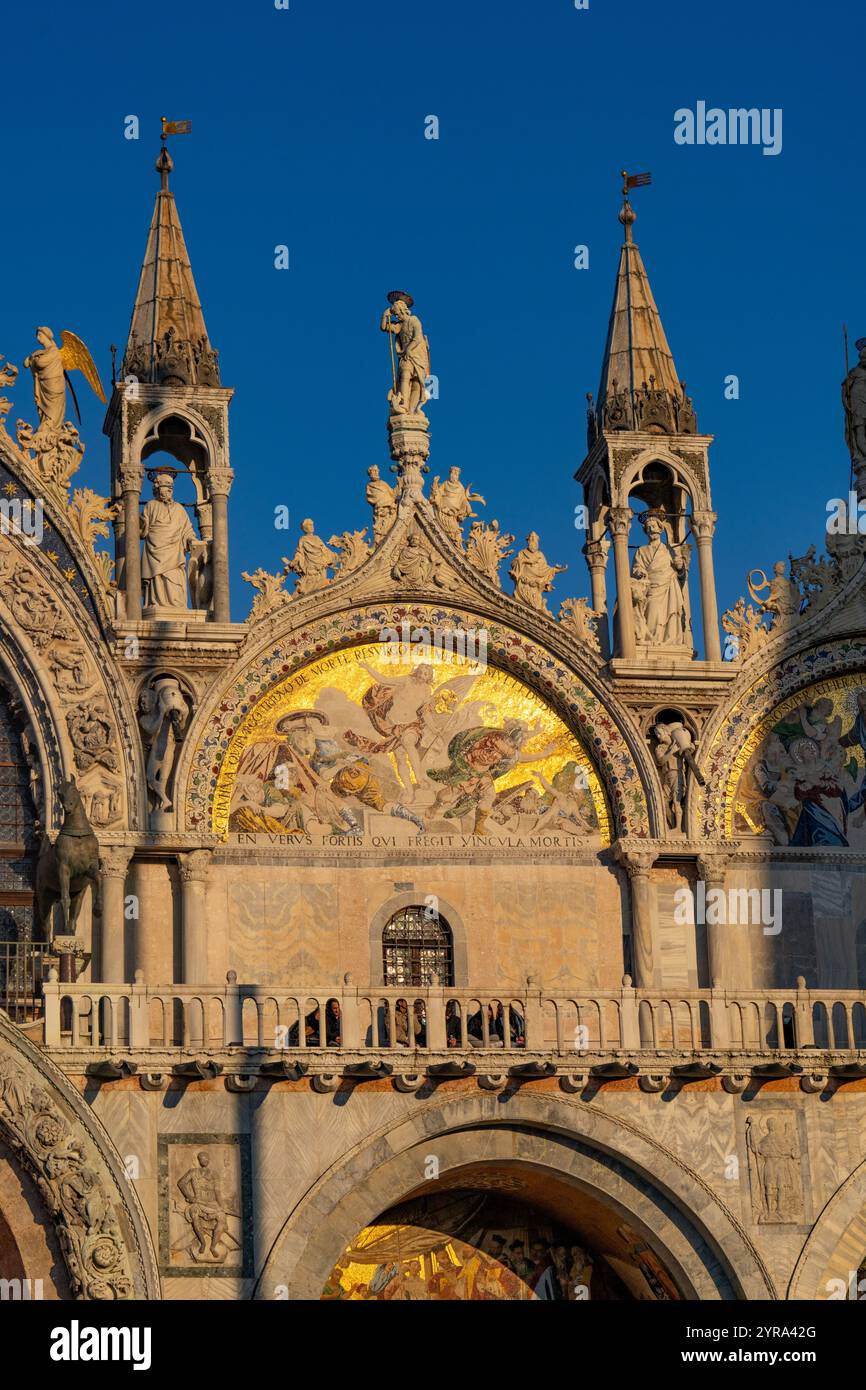 Gothic towers & statues on the west facade of St. Mark's Basilica in ...