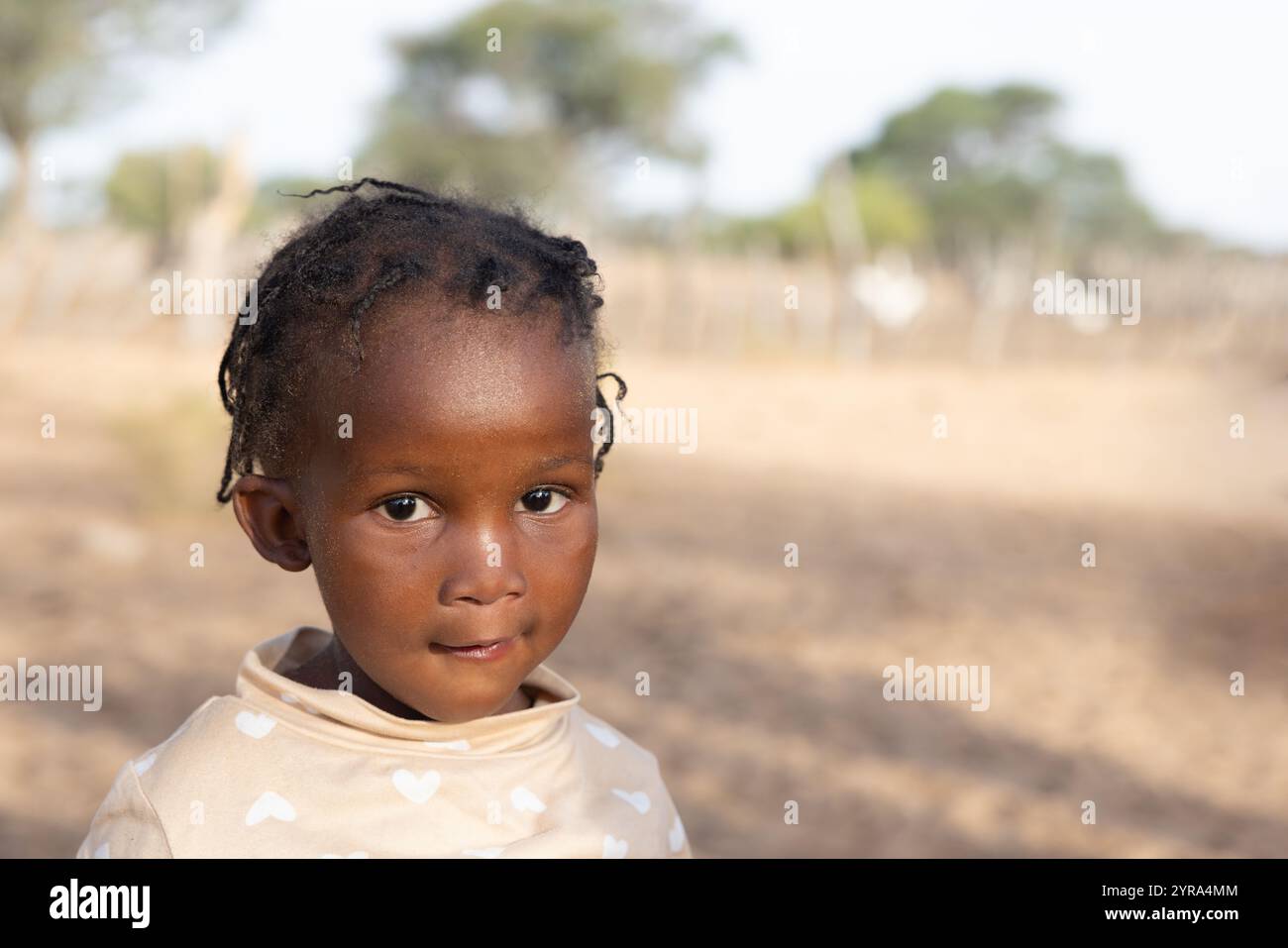 village african african child girl with braids dreadlocks with beads ...