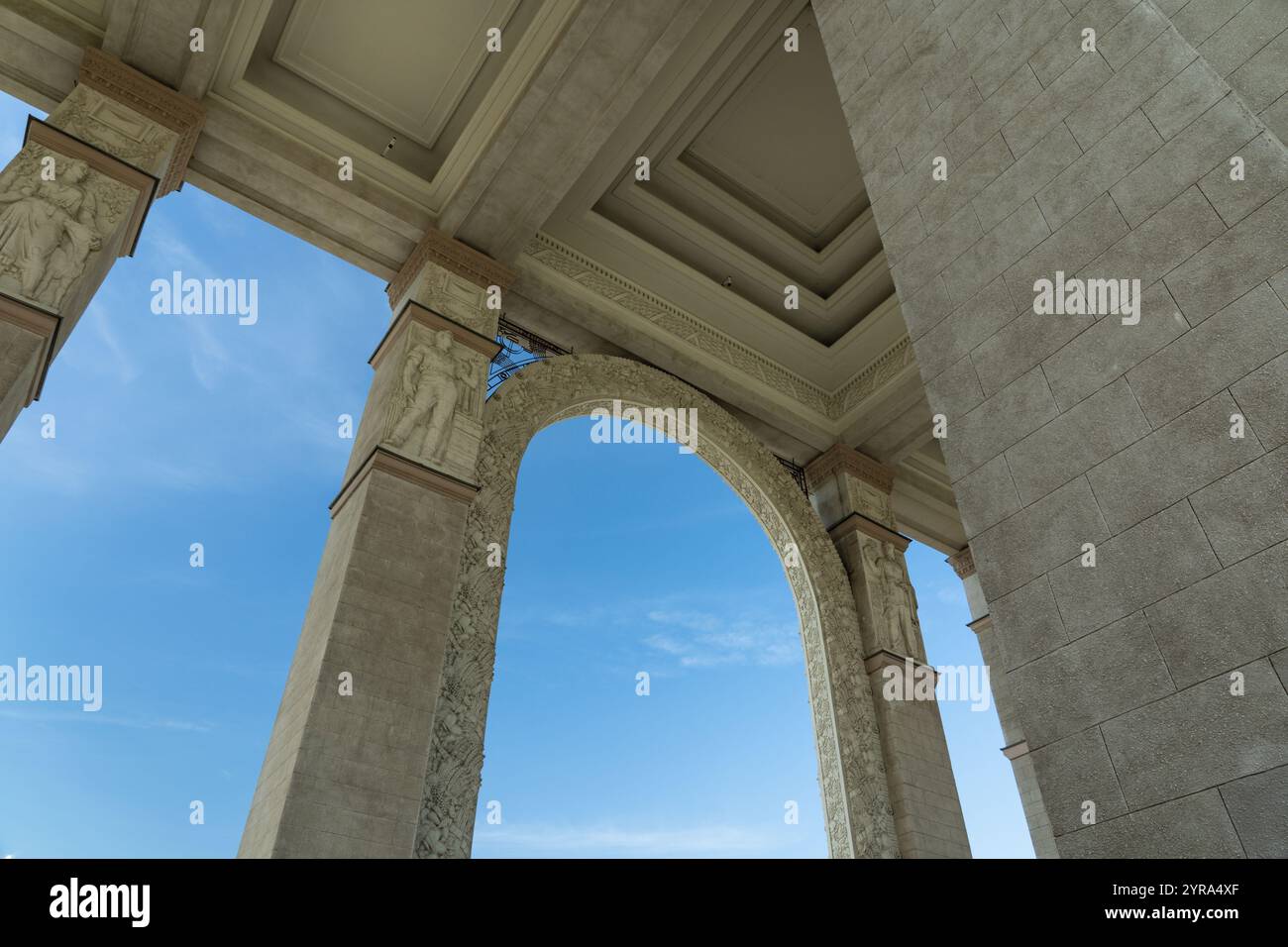 Tall, massive columns of a vintage, old building. Bottom-up view Stock ...