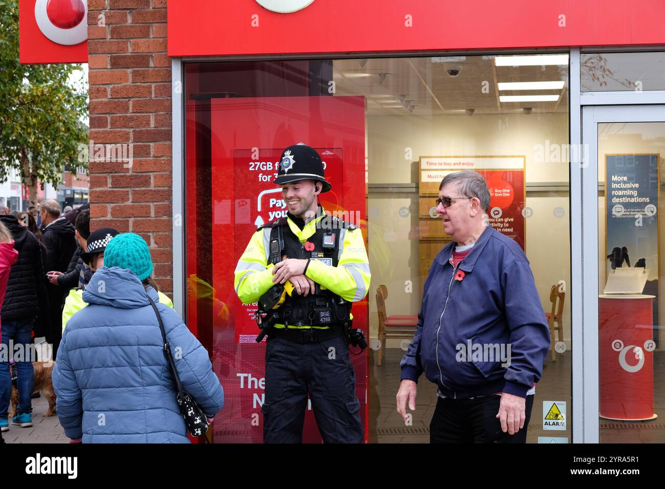 Police officer talking to public hi-res stock photography and images ...
