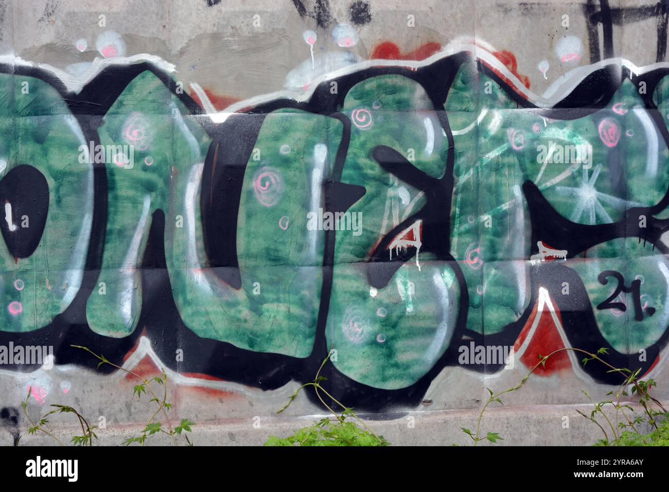 Green letters and white lines with thick black borders. A drawing ...