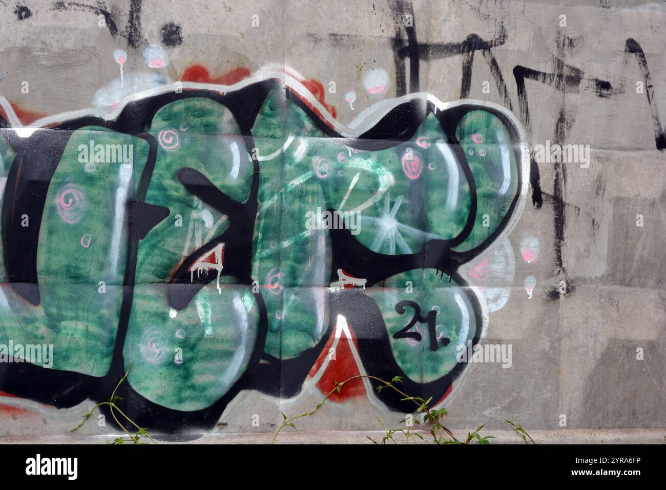 Green letters and white lines with thick black borders. A drawing ...