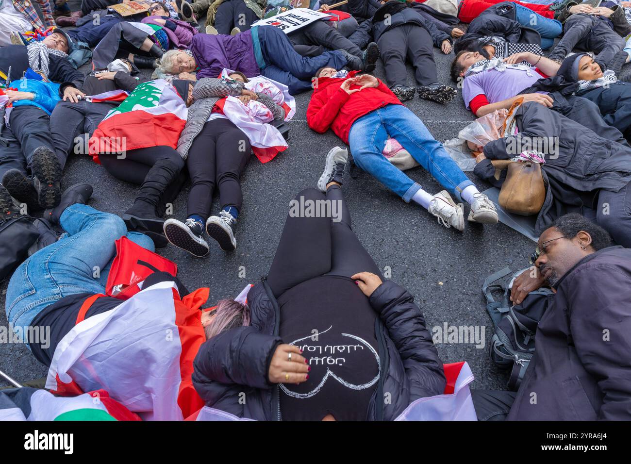 Pro-Palestinian protesters gather, stage die-ins and march from ...