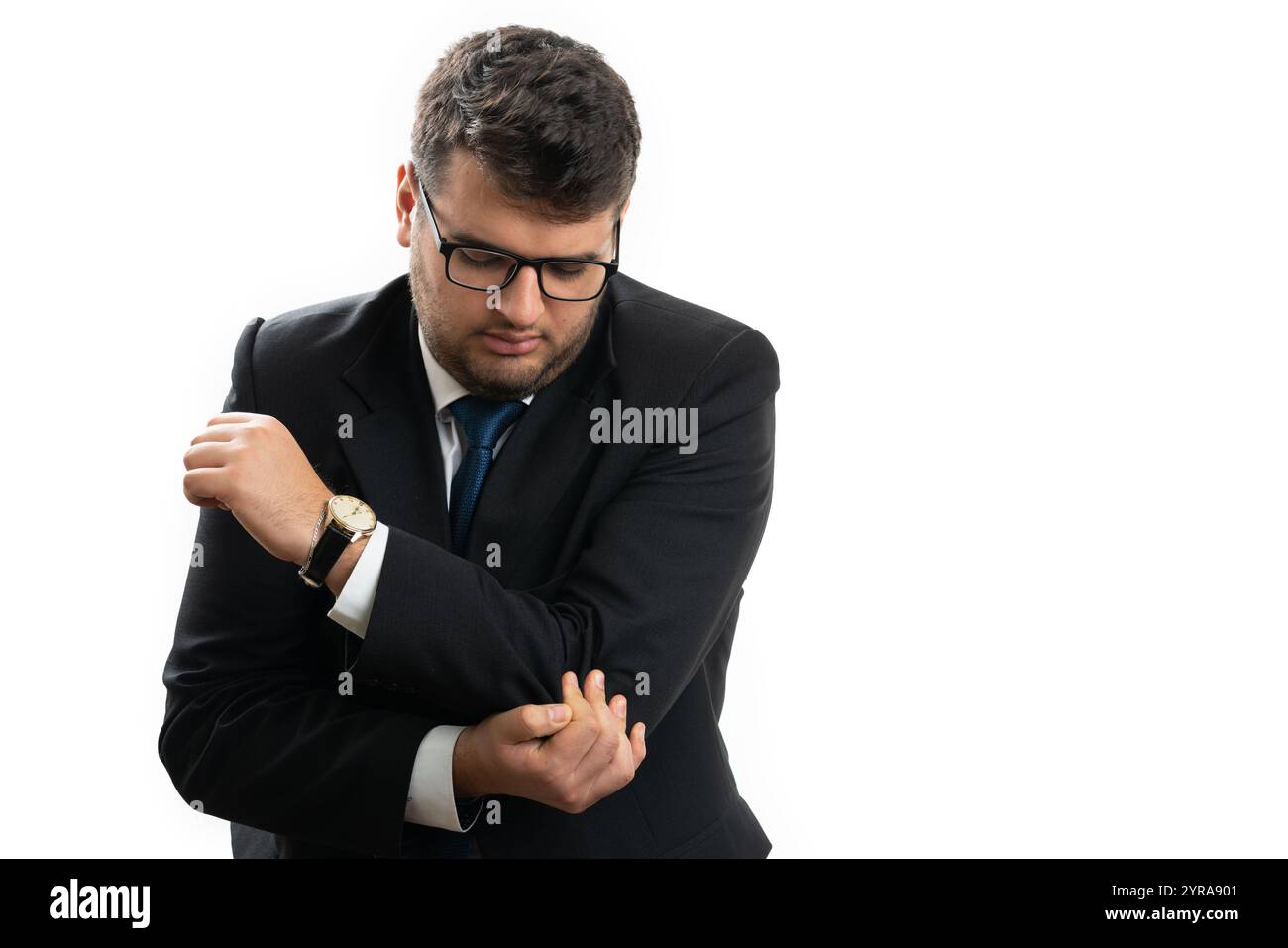 Male adult entrepreneur in smart casual office suit touching painful ...