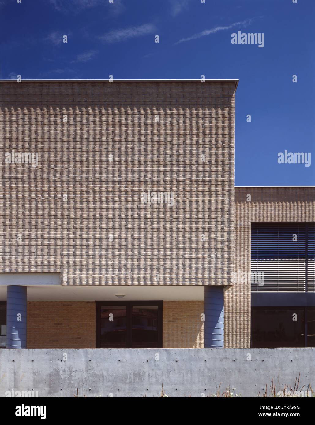 Detail of the architecture of a modern stone building, in Italy Stock ...