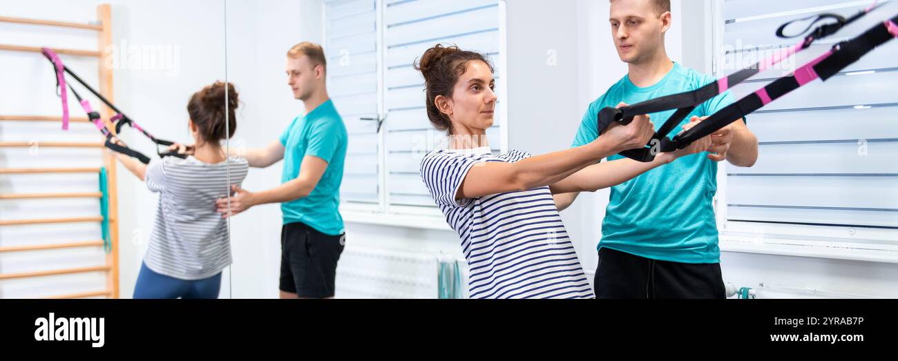 Woman with shoulder pain in physical therapy. Physical therapist ...