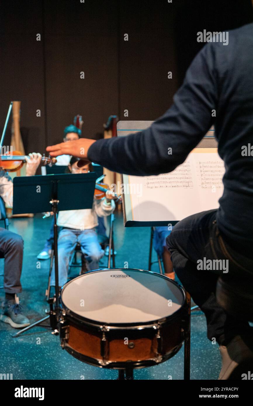 Musical training with children in a music school *** Local Caption ...
