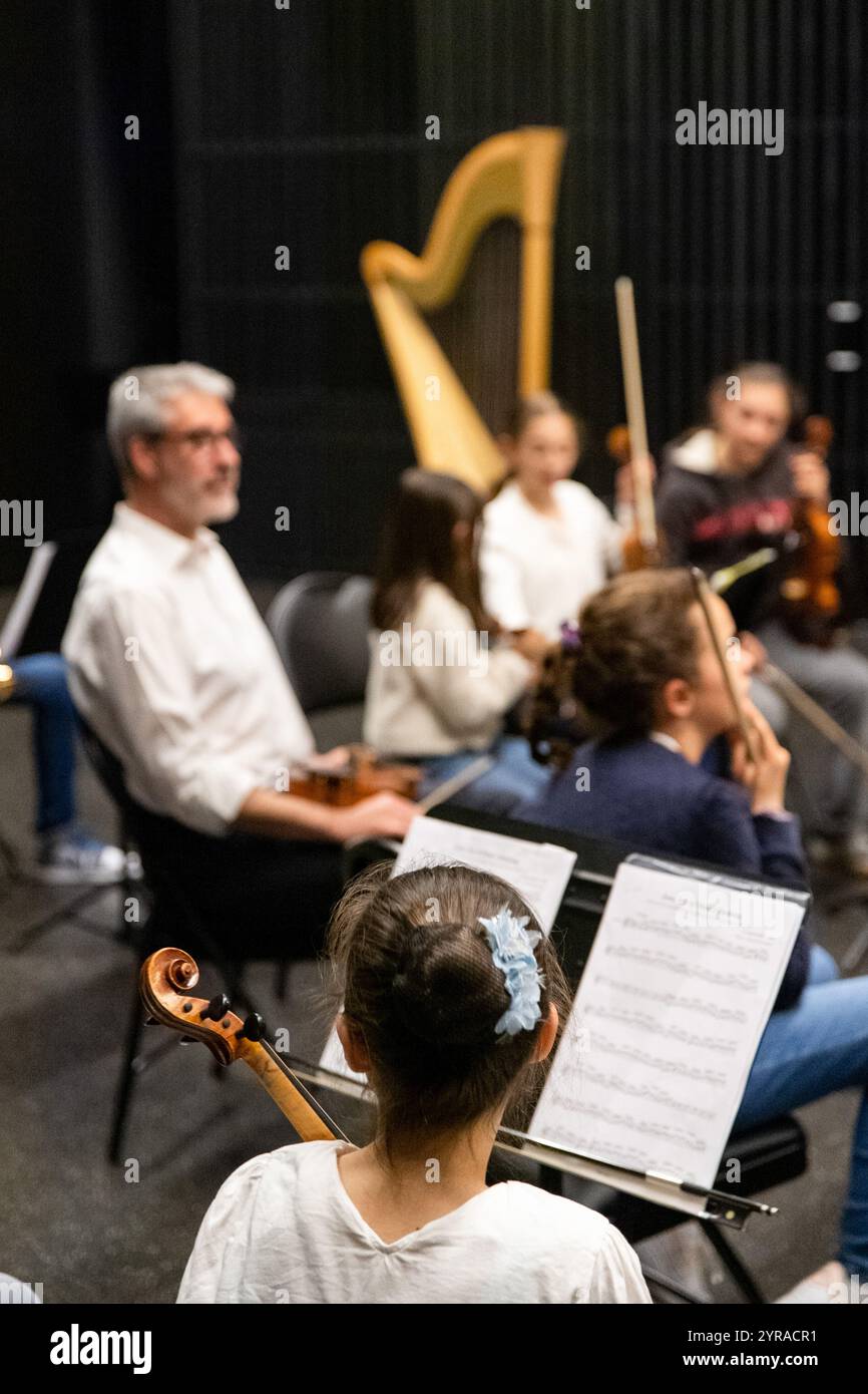 Musical training with children and adults in a music school *** Local ...