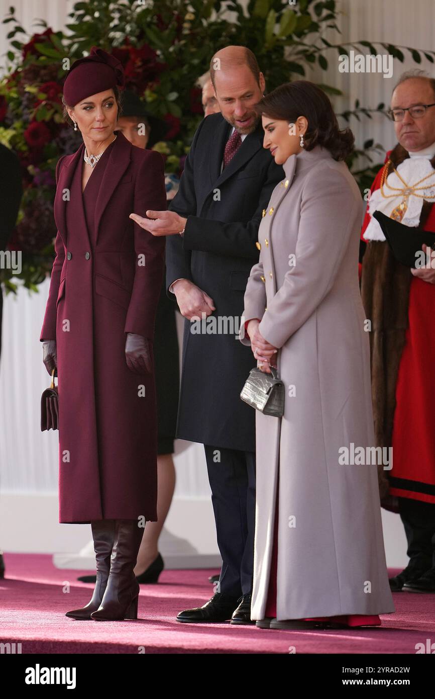 The Prince and Princess of Wales talk with Sheikha Jawaher, the wife of ...