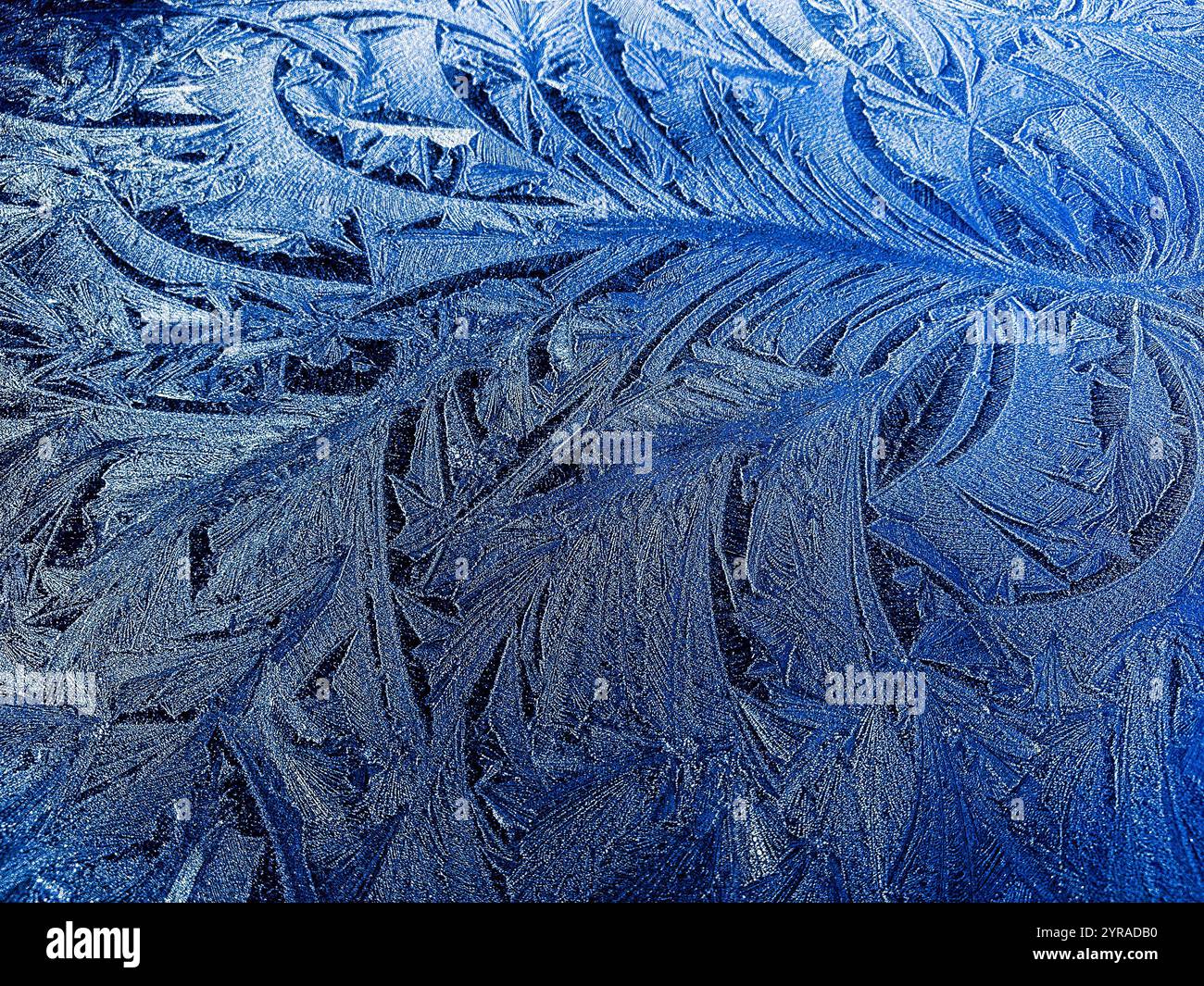 Pretty, icy blue frost patterns, ice crystal backgound Stock Photo - Alamy