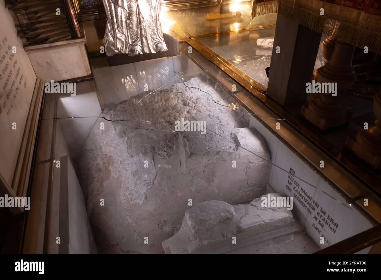 Glass covers the cracked Rock of Calvary which according to earliest ...