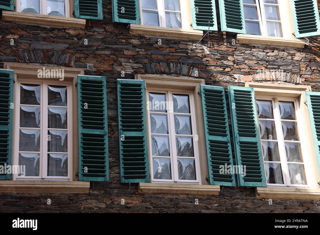 Windows with shutters on an old stone house Stock Photo - Alamy