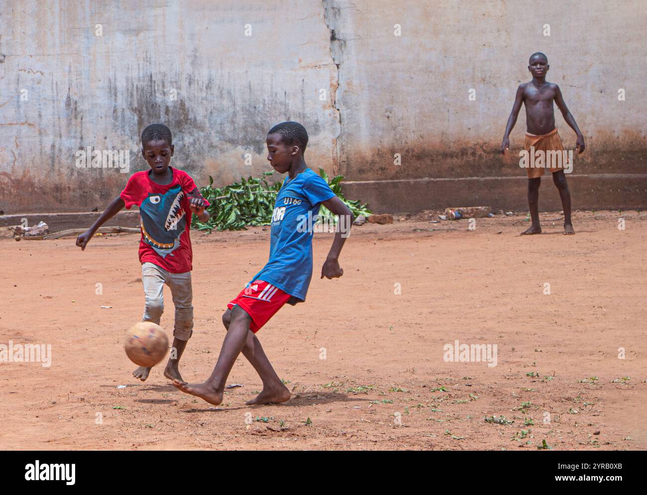 Children Playing Football on a Dusty Field in a Rural Village in Togo ...