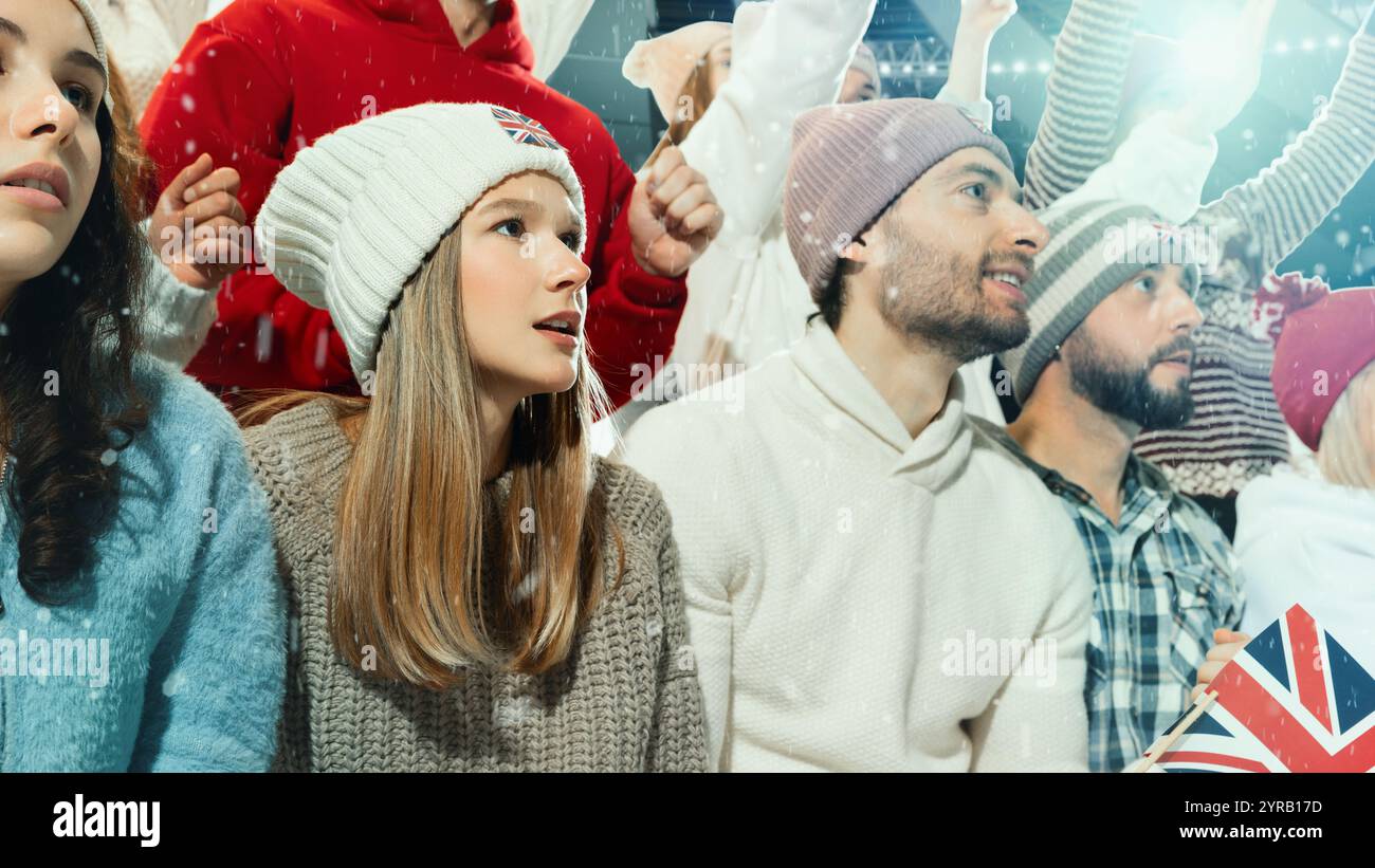 Sports fans, men and women intently watching game in stadium during ...