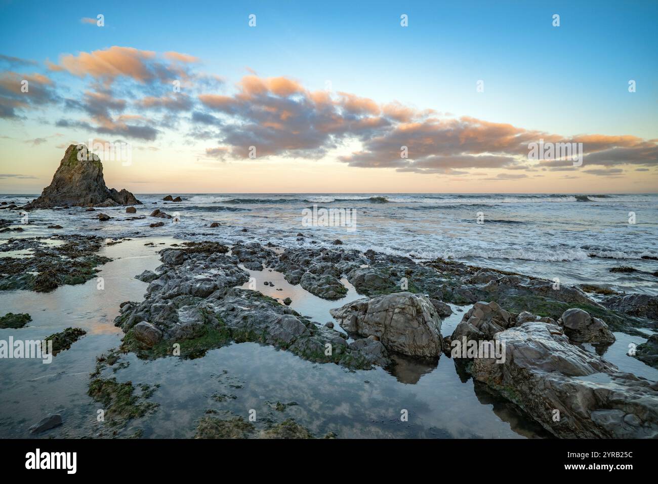 Cold sunny December dawn at Widemouth Bay beach in Cornwall Stock Photo ...