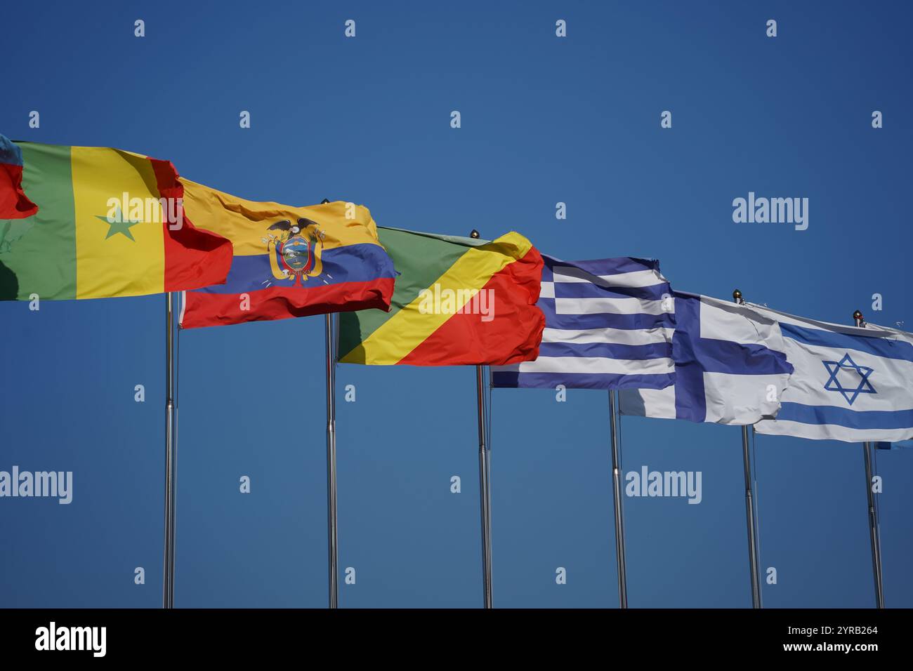 Flags of Ecuador and the Republic of the Congo fluttering in the wind ...