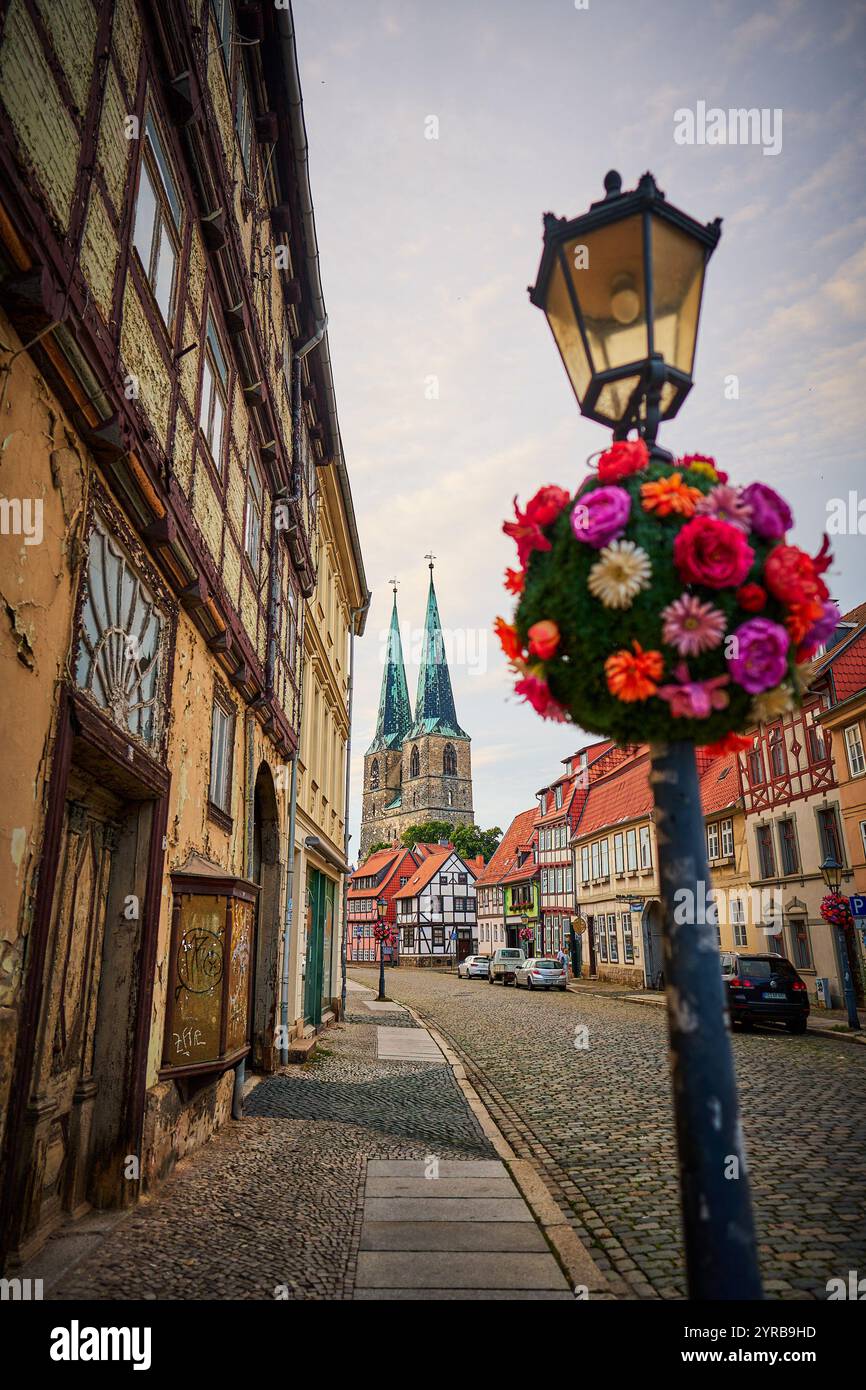 A charming street in Quedlinburg, Germany, featuring historic buildings ...