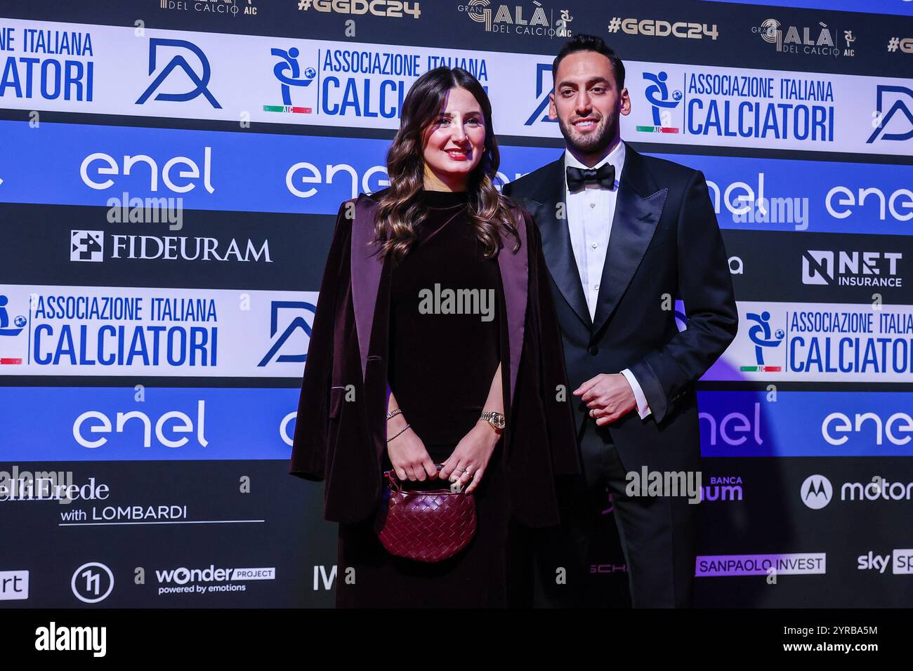 (R-L) Hakan Calhanoglu with his wife Sinem Gundogdu seen on the Red ...
