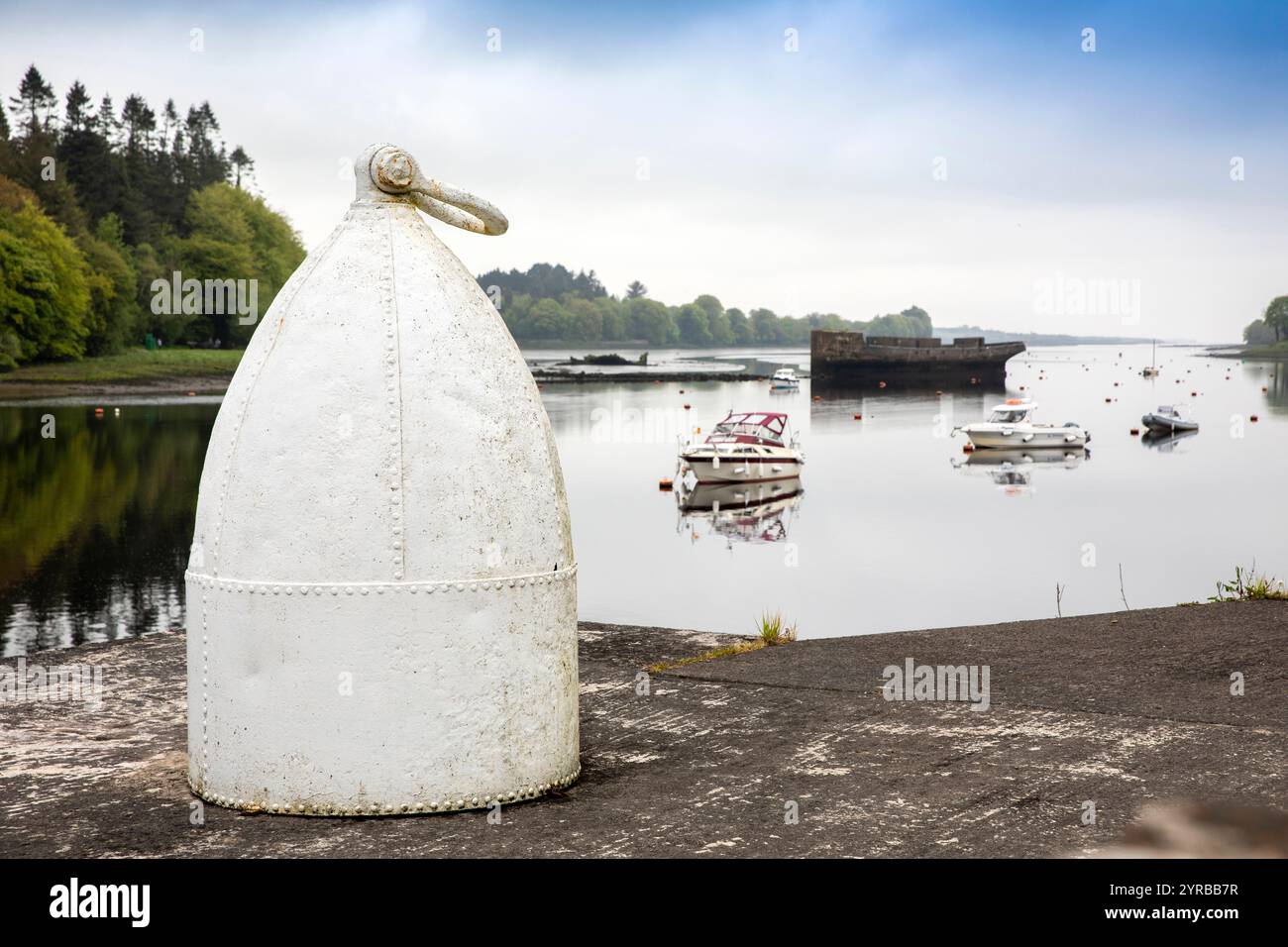 Ireland, County Mayo, Ballina, River Moy, Quay, white painted buoy at ...