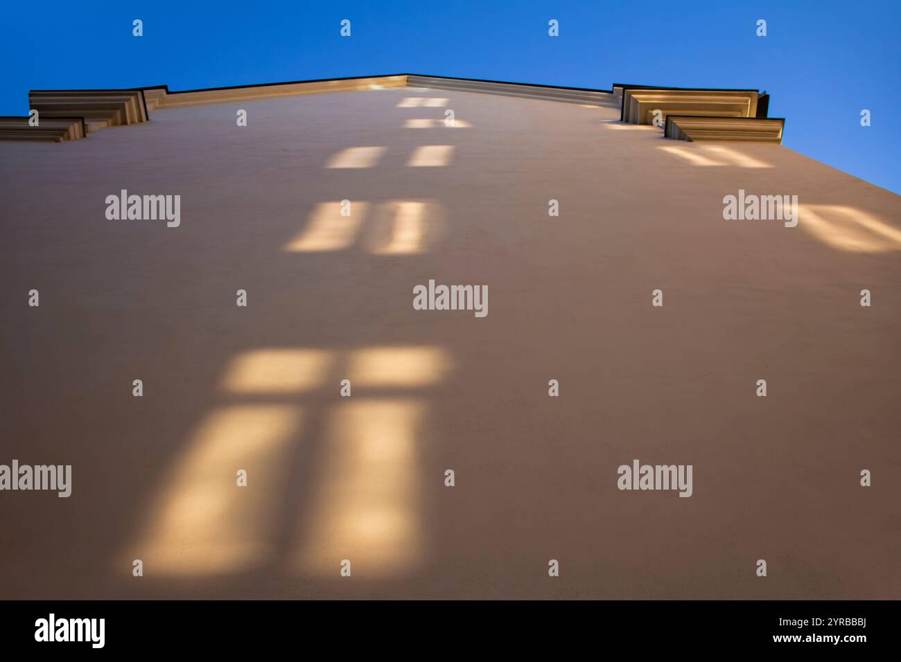 Empty Building Facade Viewed from Below with Sun Reflections Creating ...