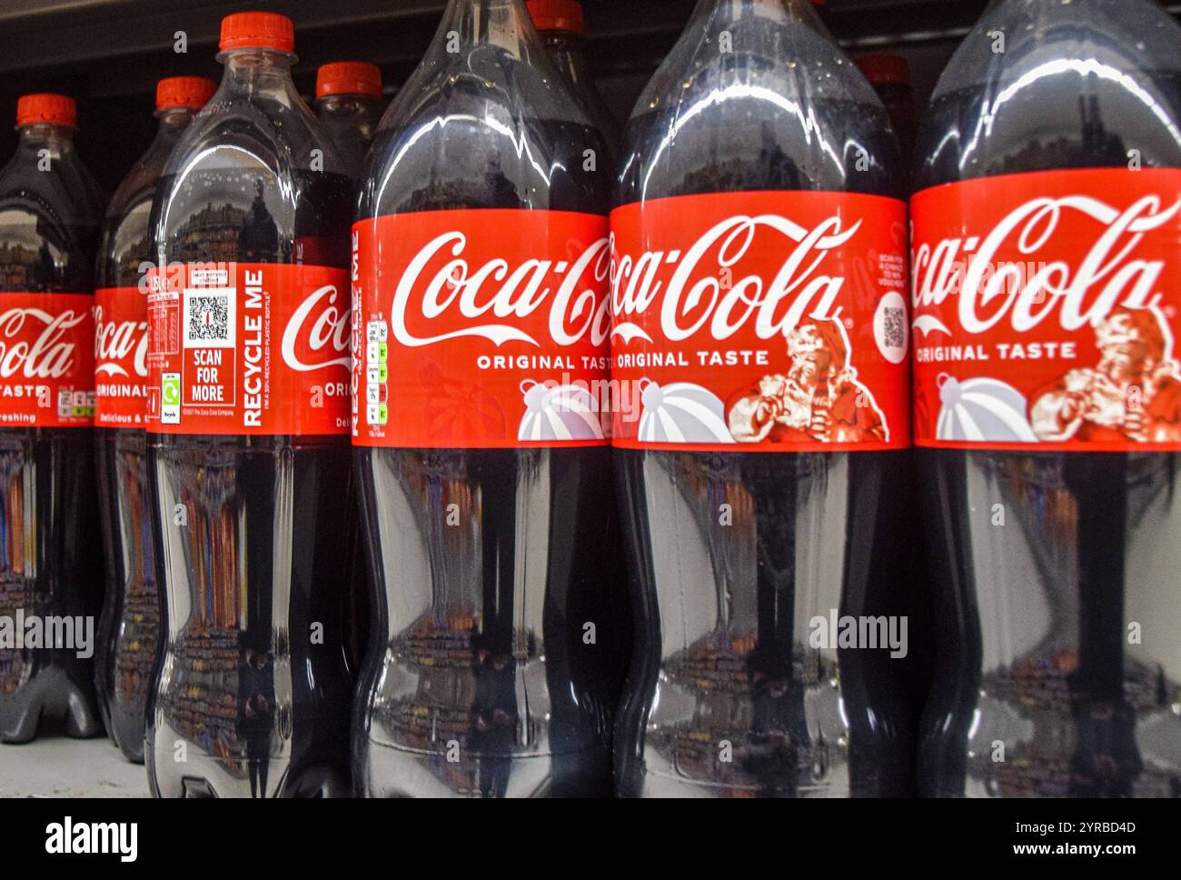 London, England, UK. 3rd Dec, 2024. Plastic bottles of Coca-Cola on ...