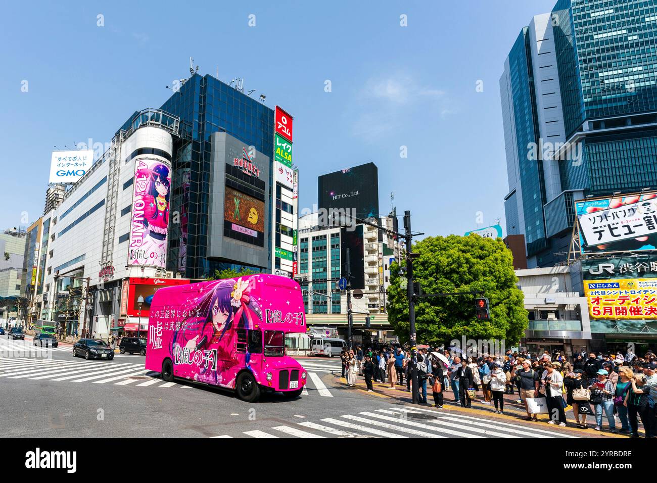 A london bus painted pink for a Japanese pop star promotion crossing ...