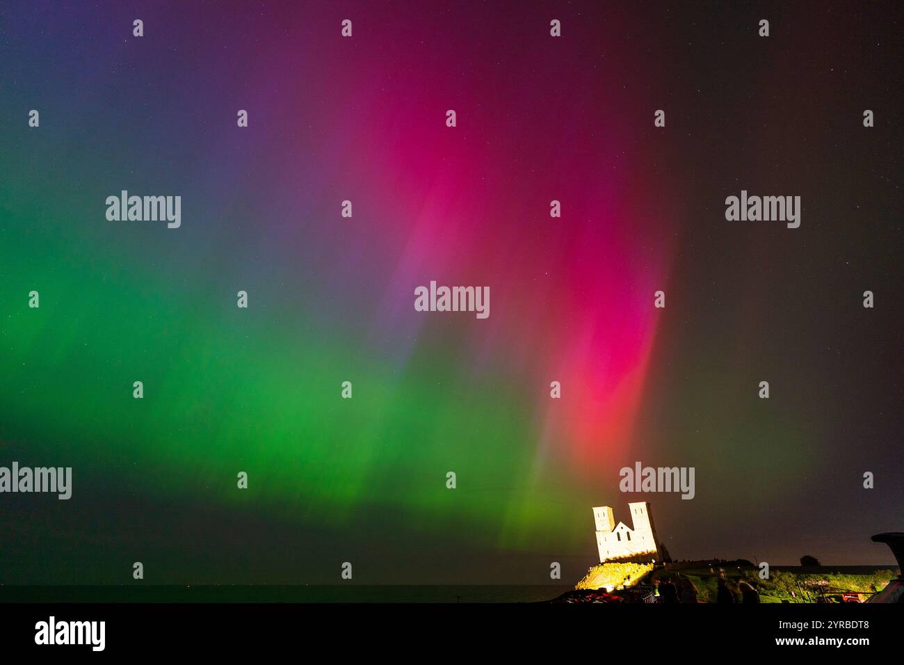 The Northern Lights, Aurora Borealis, green and pink, over the twin ...