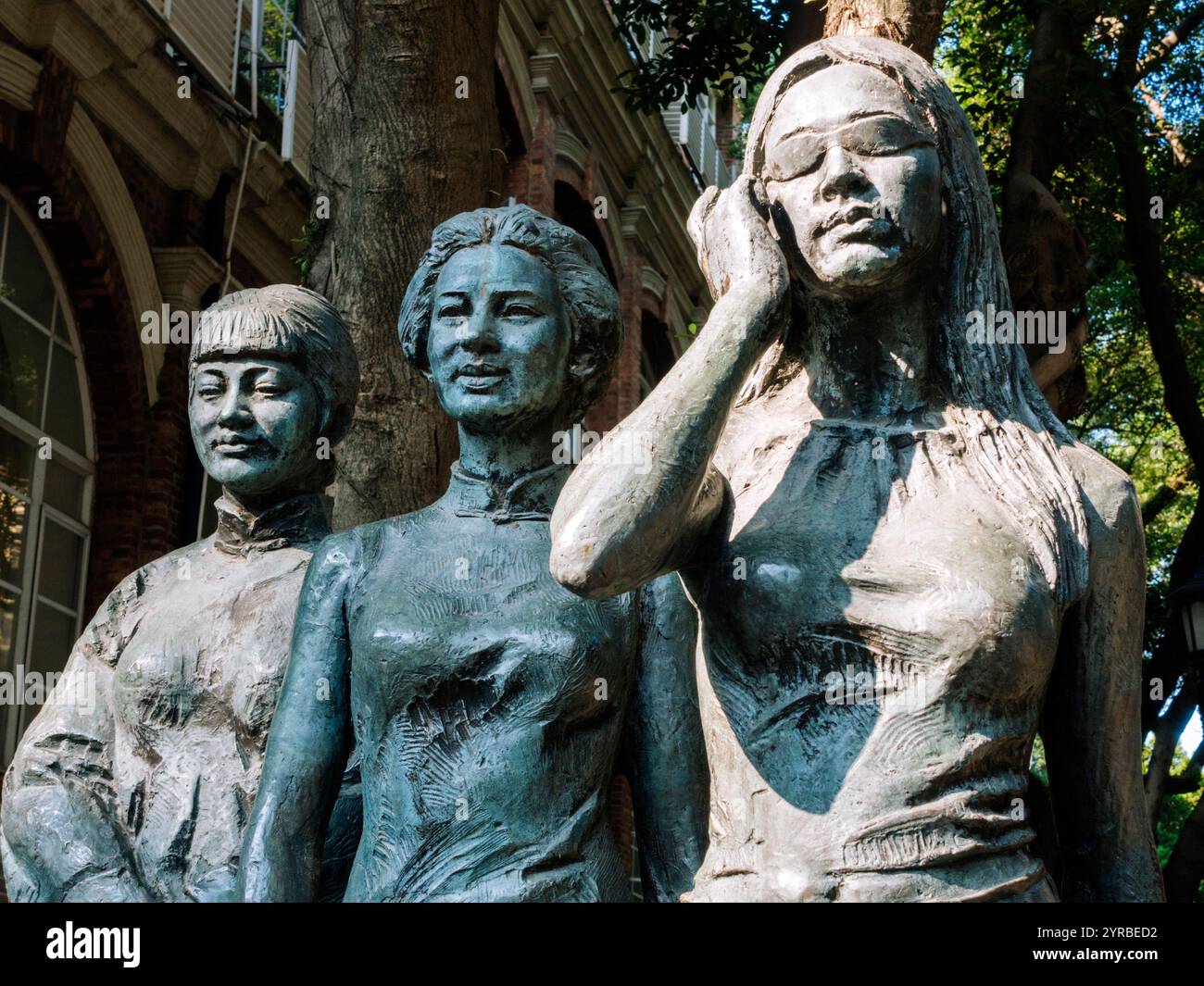 Female bronze statues on Shamian Island (Guangzhou/China Stock Photo ...