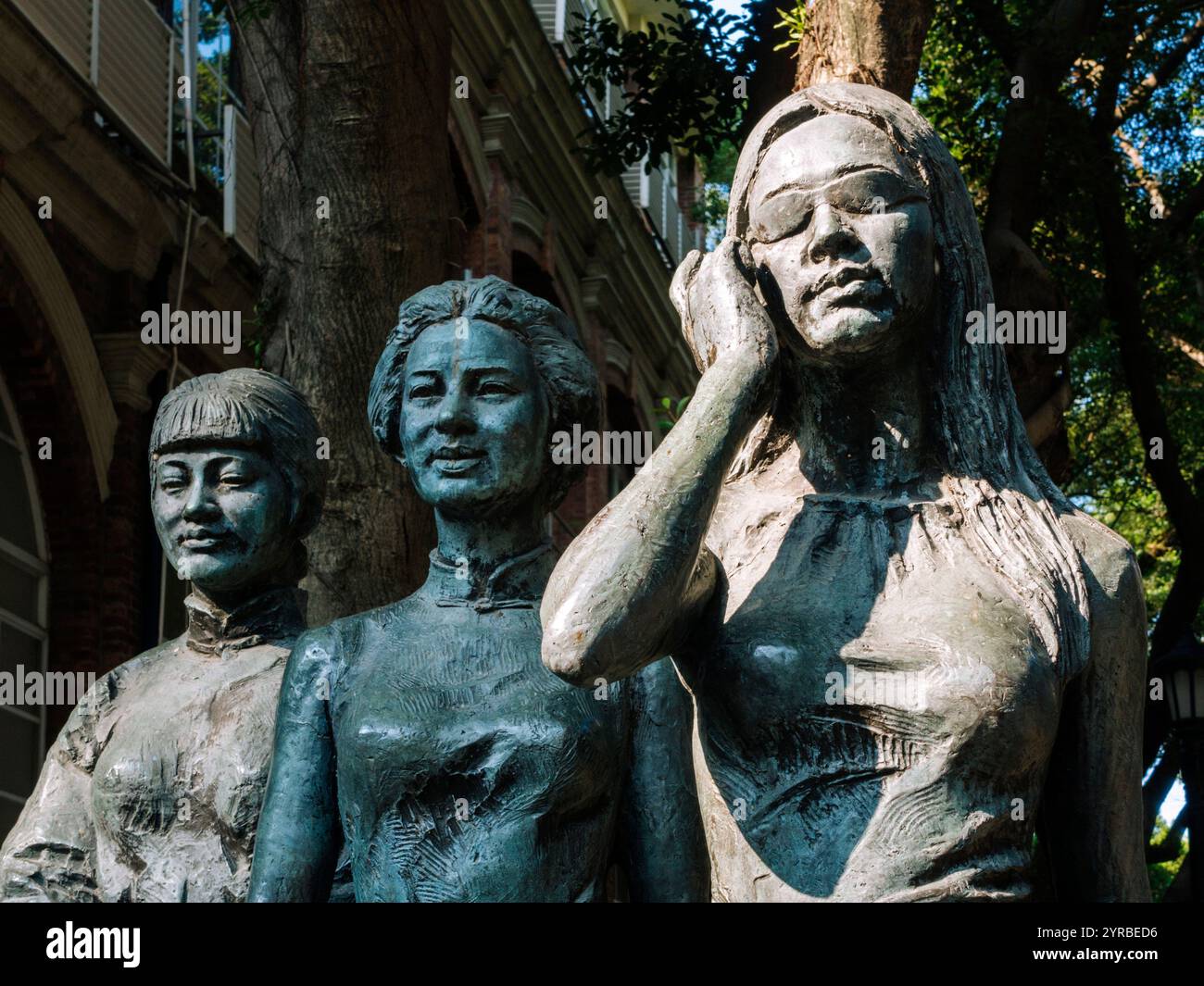 Female bronze statues on Shamian Island (Guangzhou/China Stock Photo ...