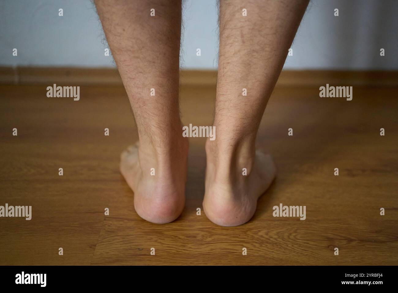 feet and calves of a man from behind Stock Photo - Alamy