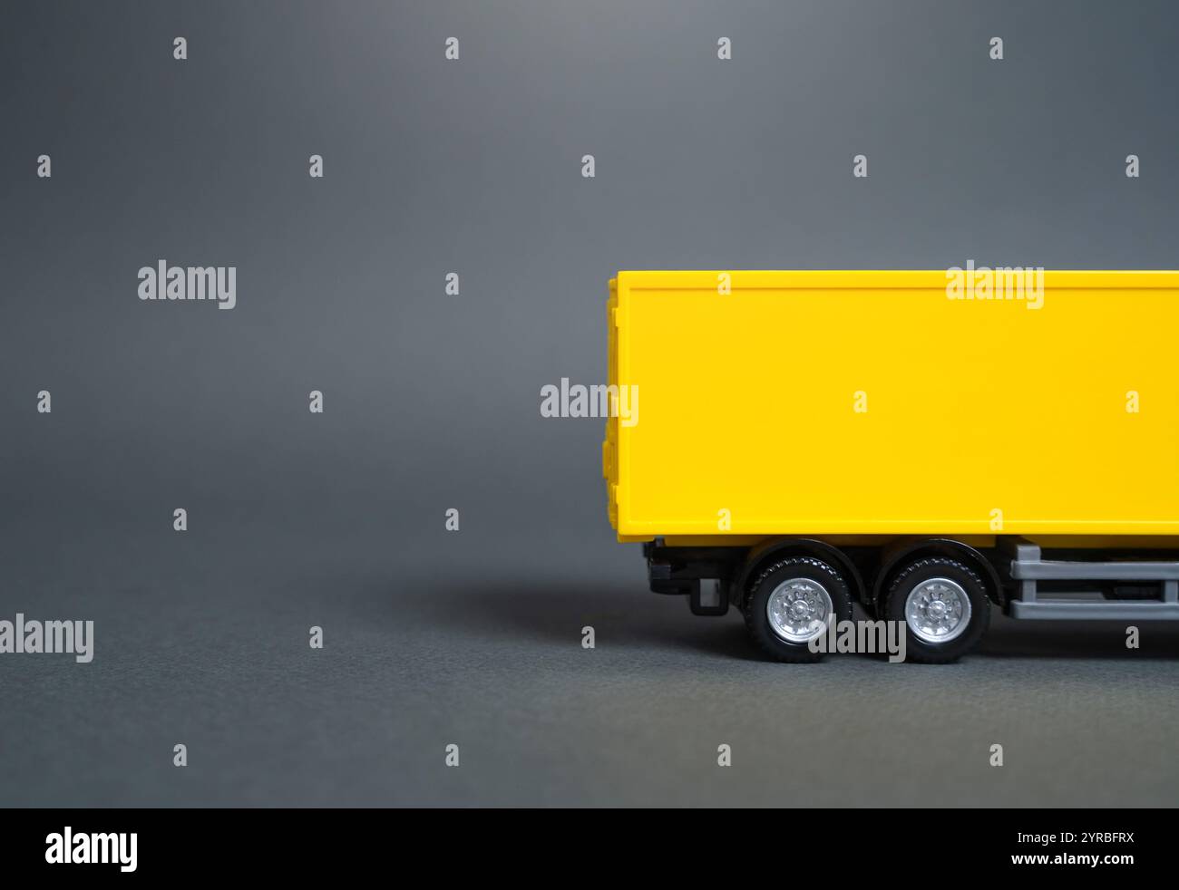 Yellow truck side view. Empty yellow background. Concept of ...