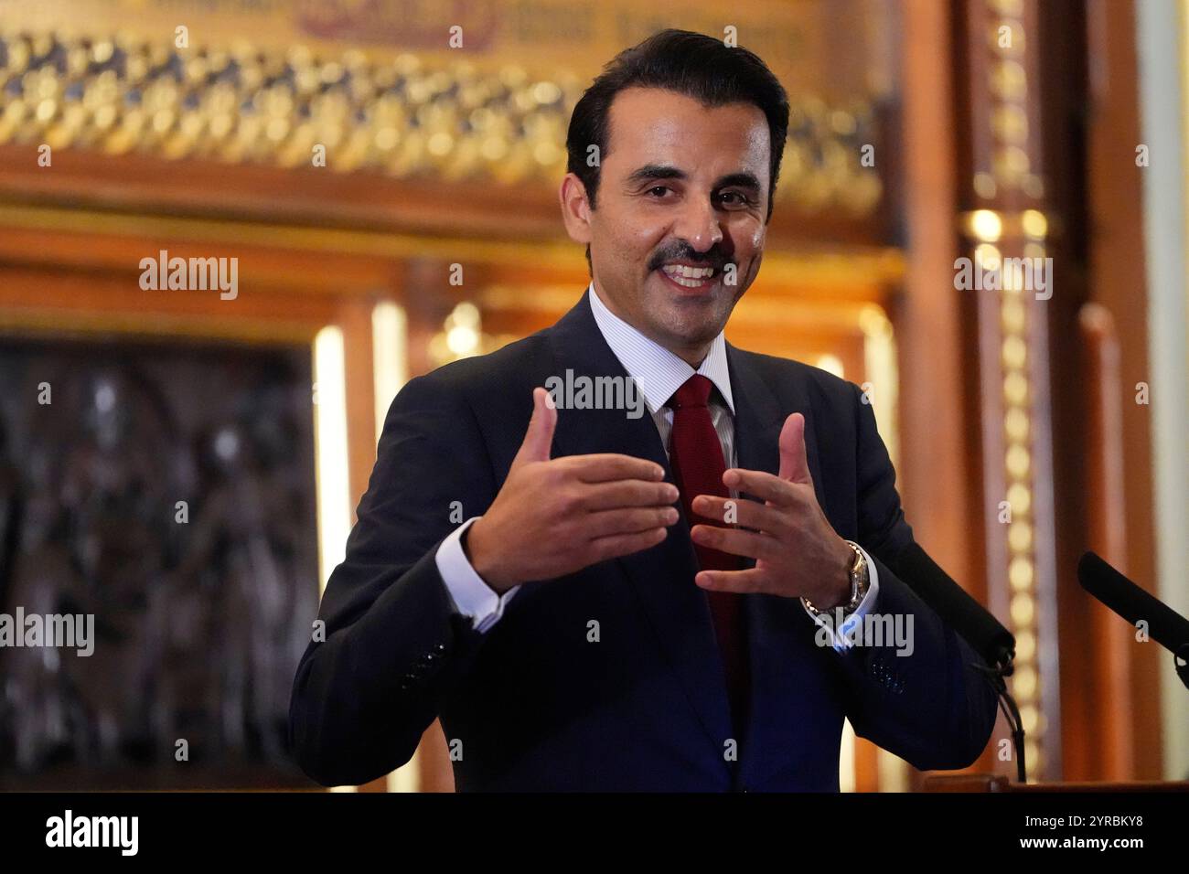 The Emir of Qatar Sheikh Tamim bin Hamad Al Thani, gestures as he ...