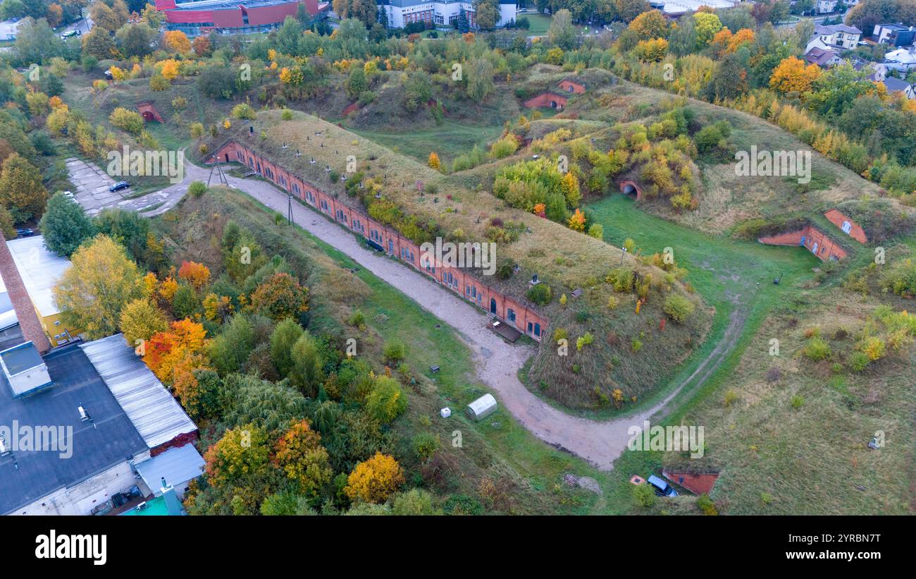 Aerial view of an old fortification surrounded by autumn foliage ...