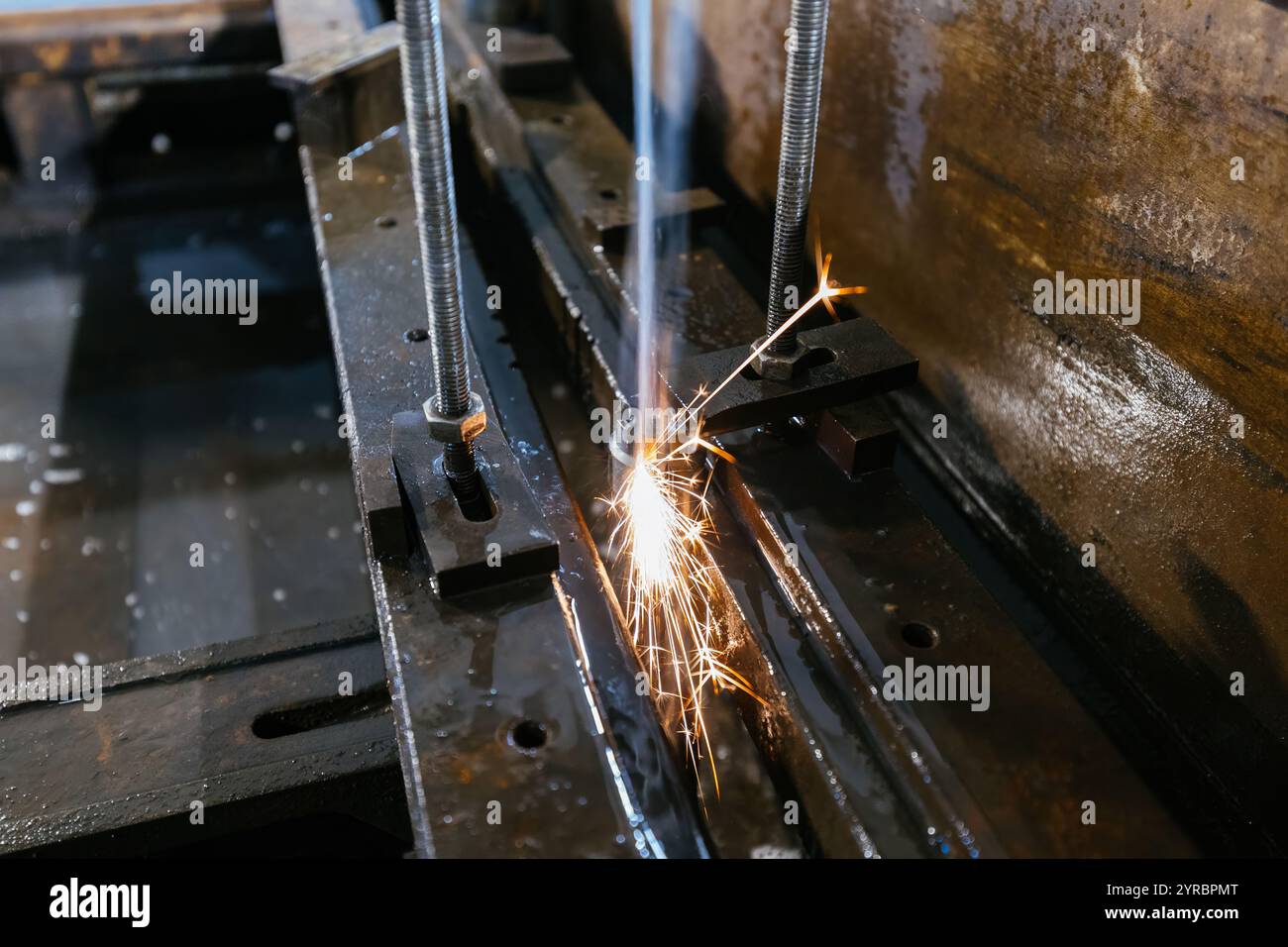 Working plasma cutter with water coolant Stock Photo - Alamy