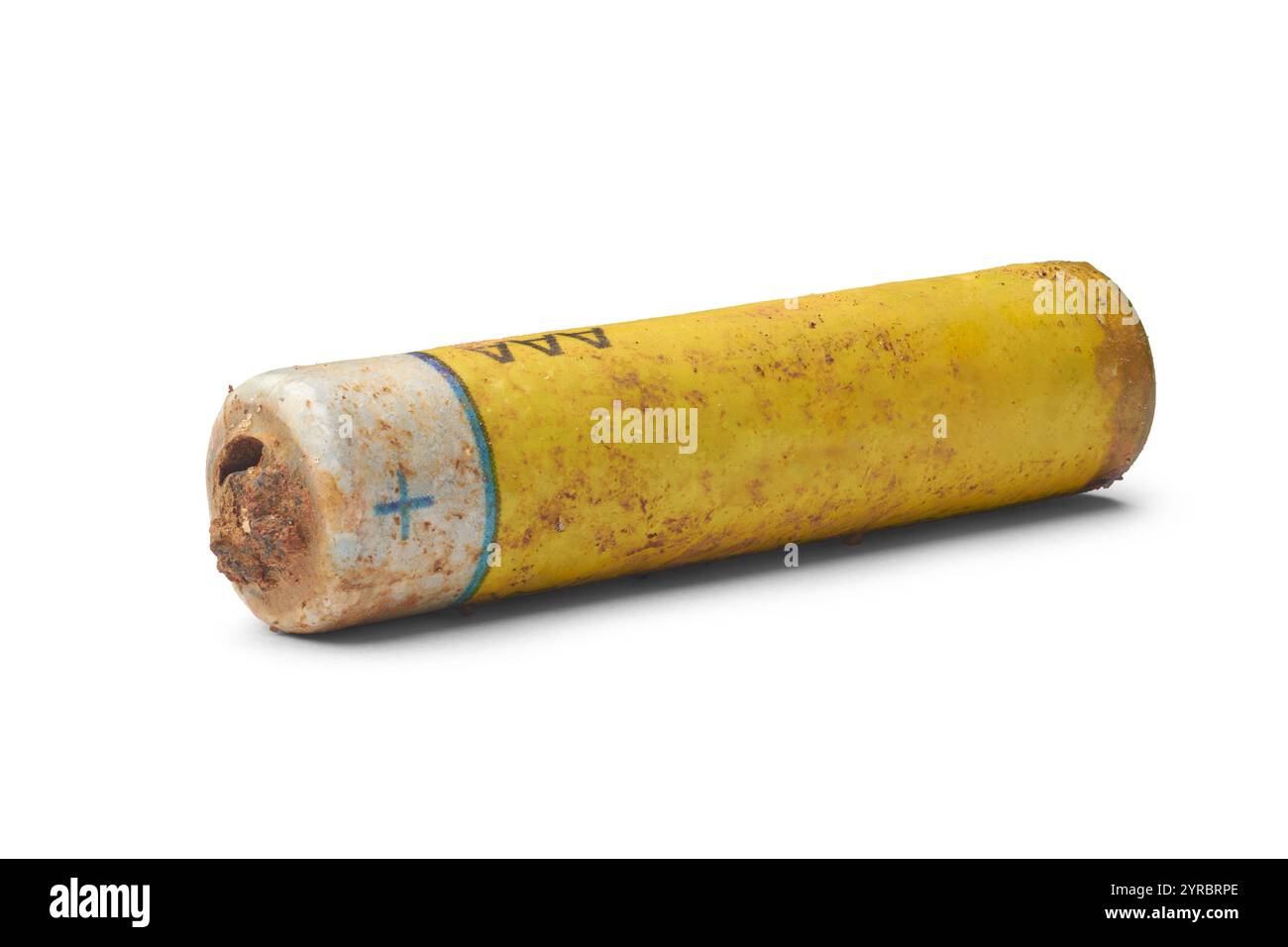 close-up of discarded old corroded battery thrown outdoors isolated ...