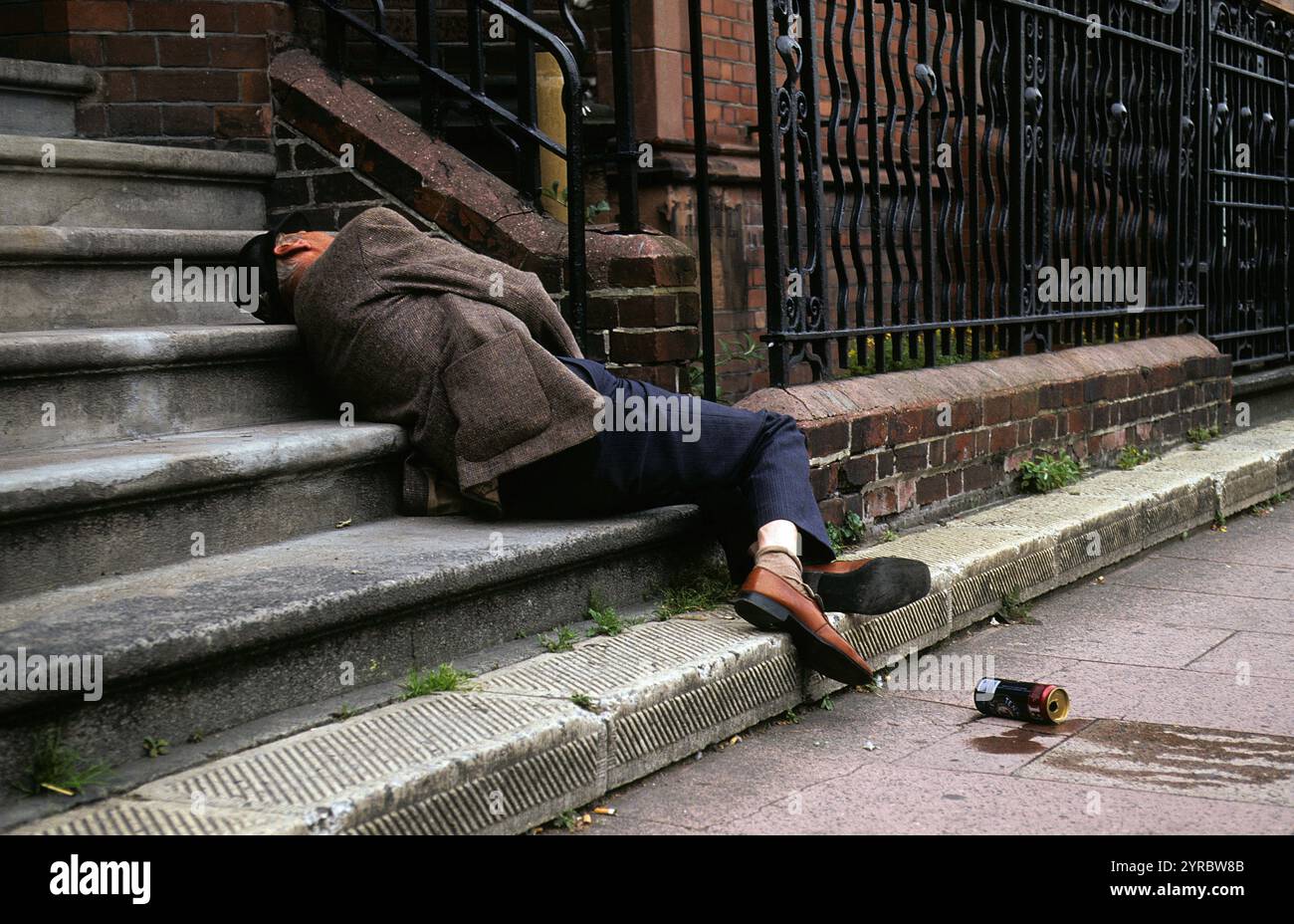 Homeless alcoholic drinking in hi-res stock photography and images - Alamy