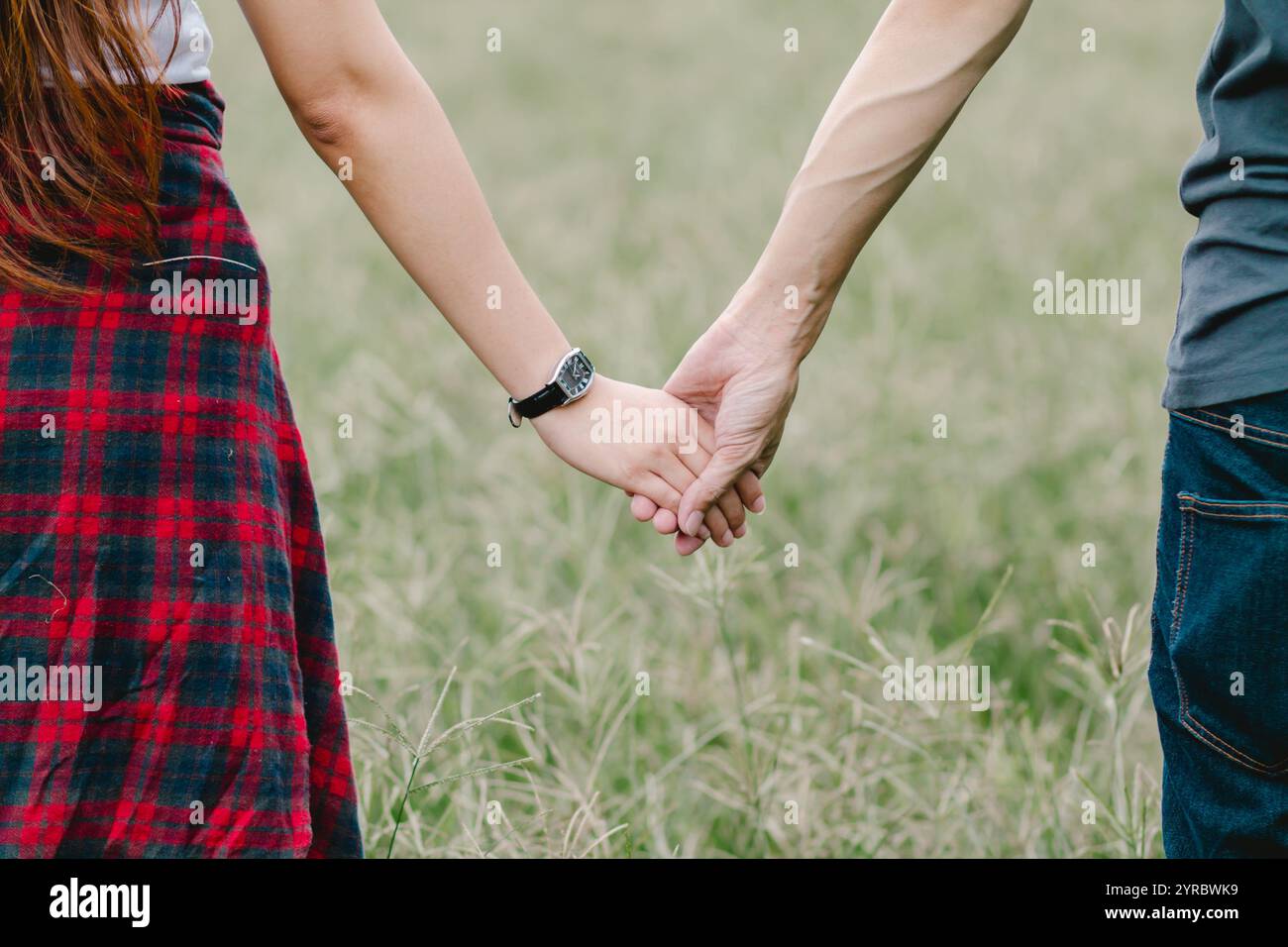 Valentine couples walk hand in hand along the aisles to see the ...