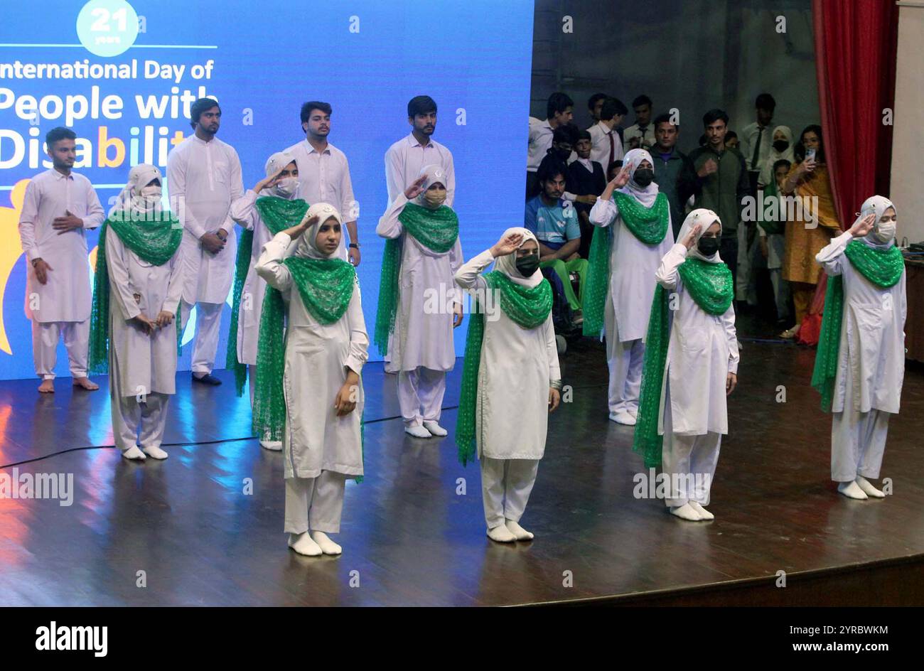 Special children are performing tableau on stage during celebration ...