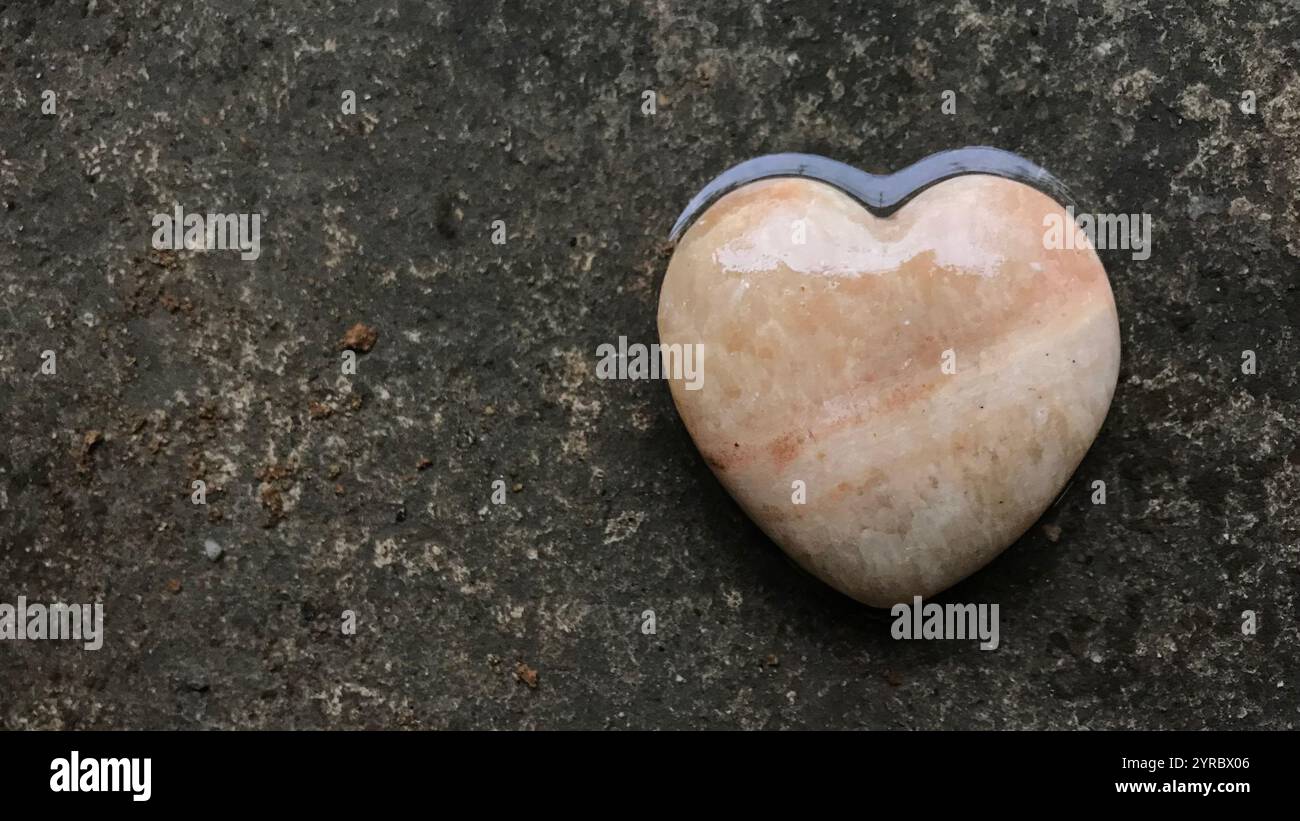 Heart-shaped stones placed on ground symbolize love, friendship and ...